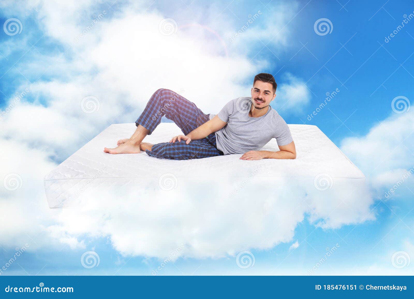 Man Lying on Mattress in Clouds Stock Image - Image of health ...