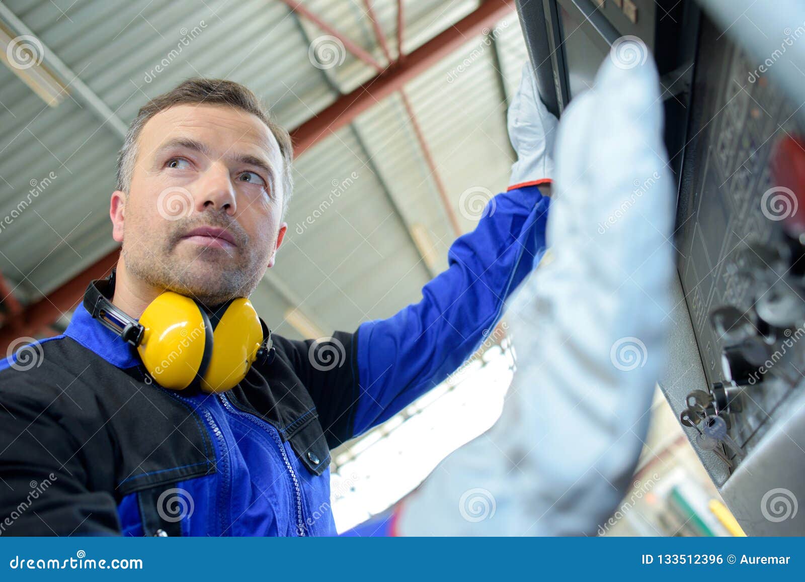 Man at Machine Control Panel Stock Photo - Image of machinist, plant ...