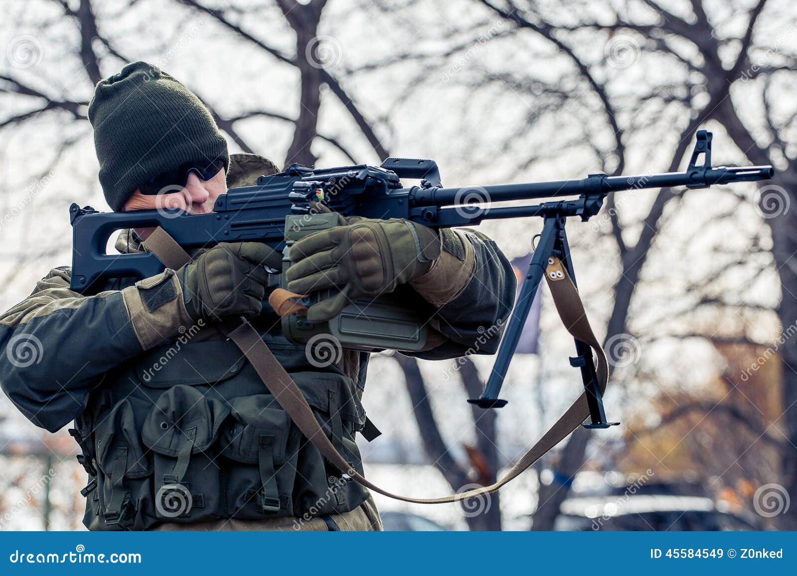 Man with a machine gun editorial stock image. Image of fight - 45584549