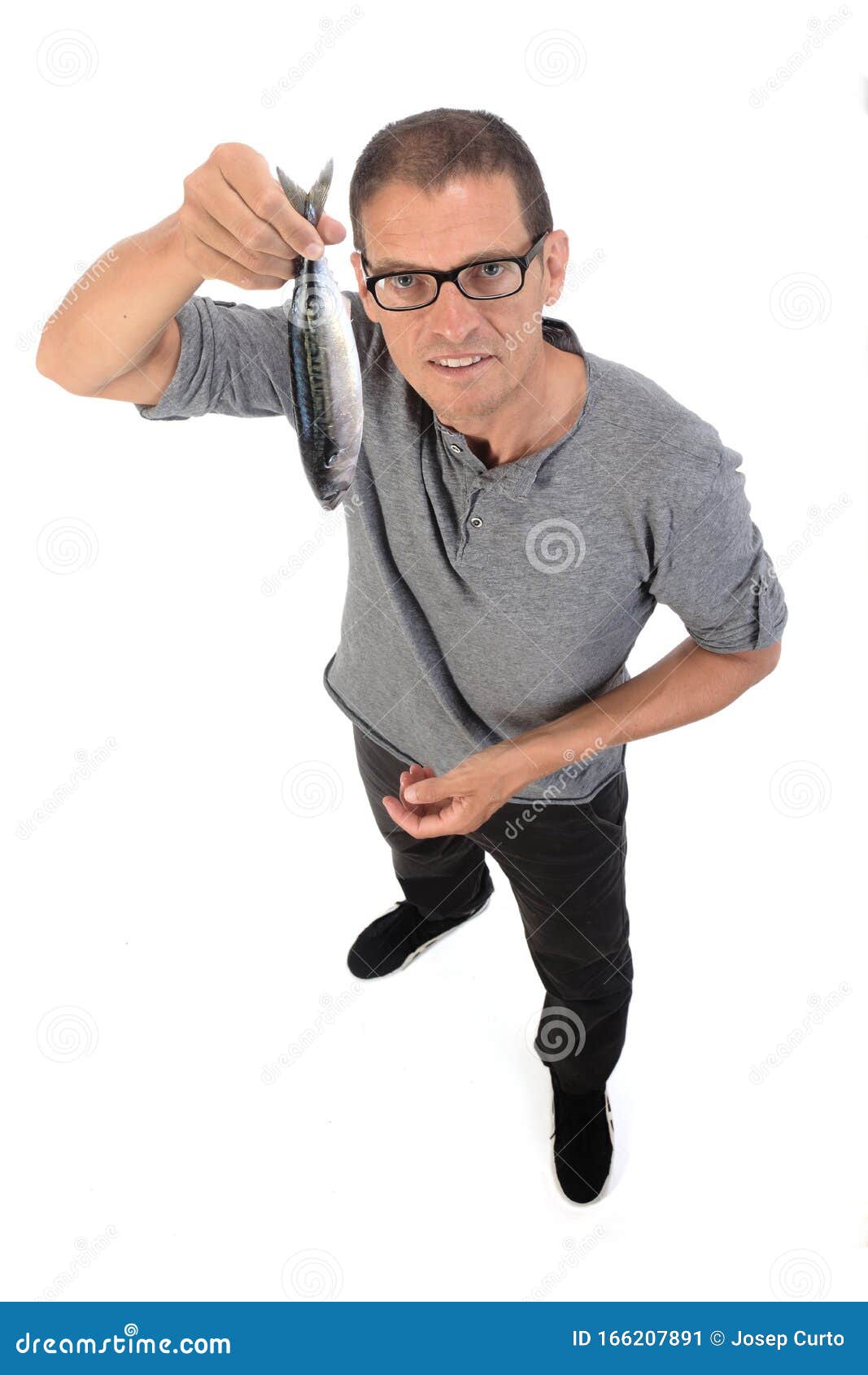 Man with Mackerel on White Background Stock Image - Image of health ...