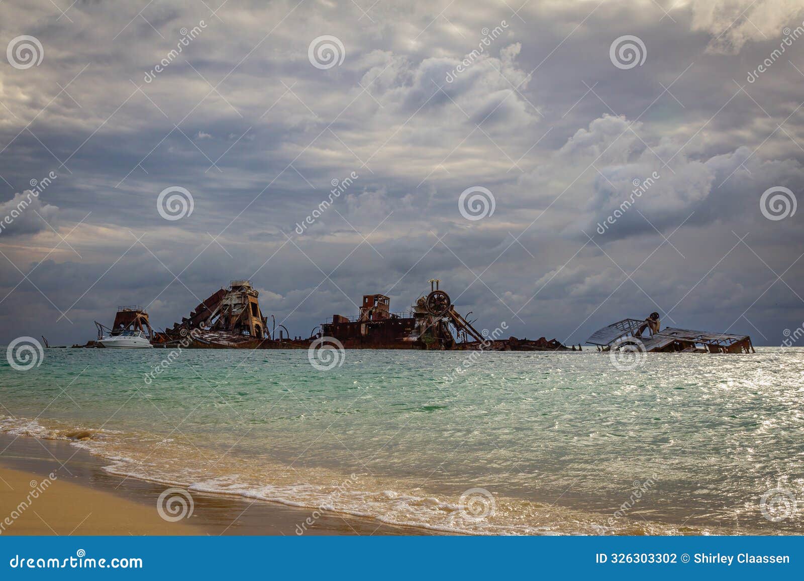 A Man Made Artificial Reef Made of Sunken Ships Under an Overcast Sky ...
