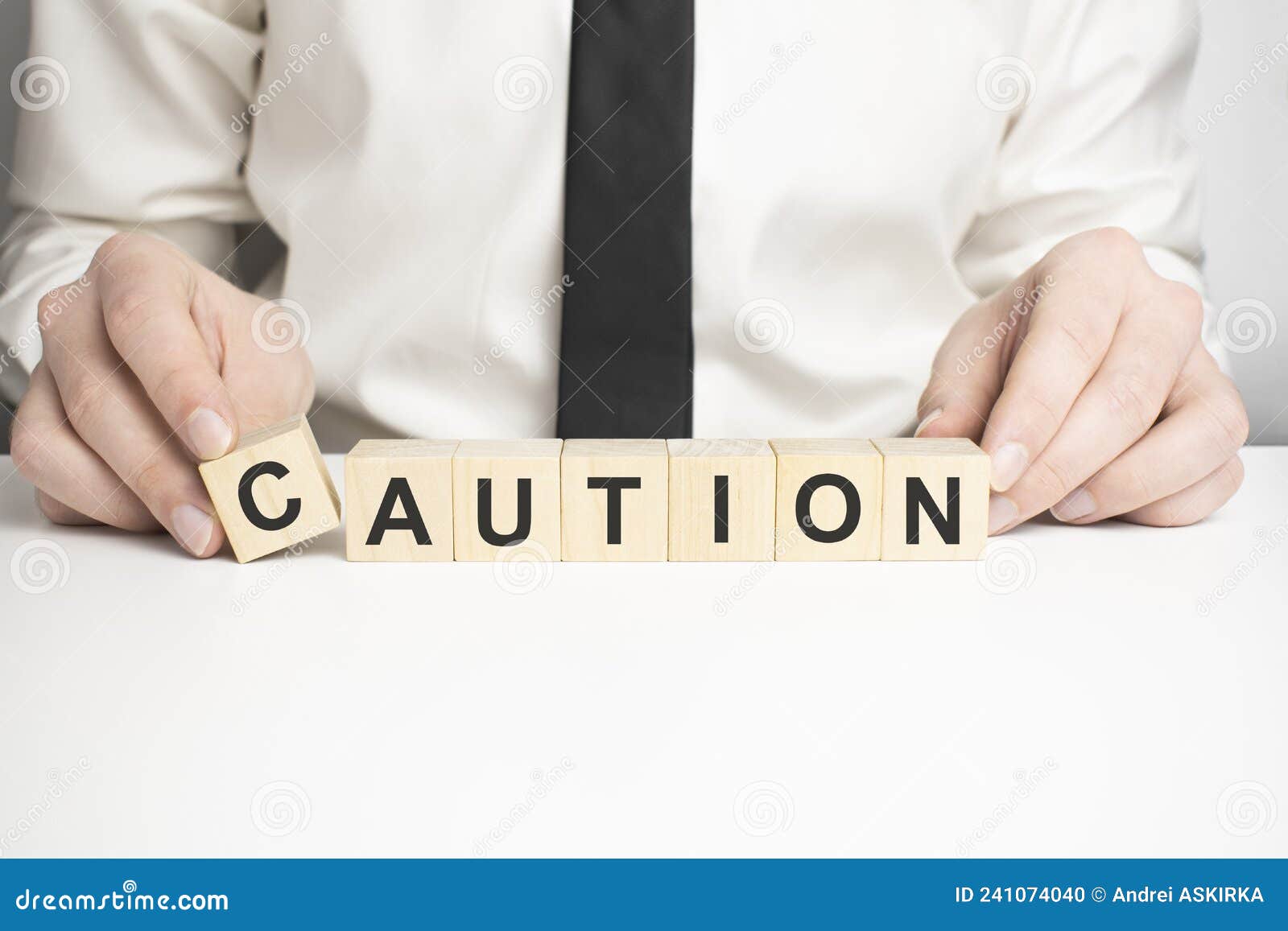 Man Made Word CAUTION with Wood Blocks Stock Photo - Image of safety ...