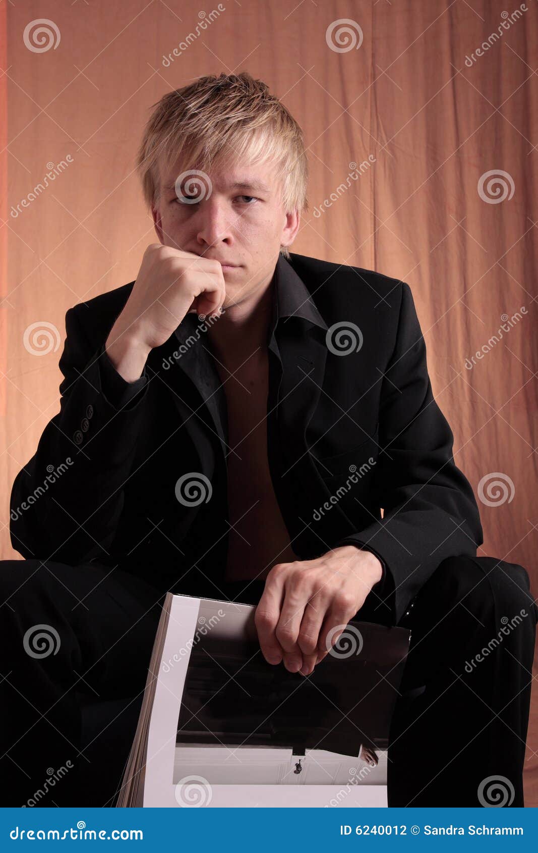 Man and magazine stock photo. Image of sitting, person - 6240012