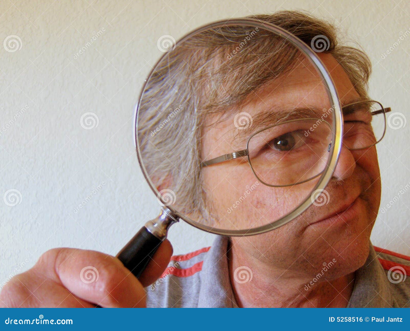 Man with magnifying glass stock photo. Image of looking - 5258516