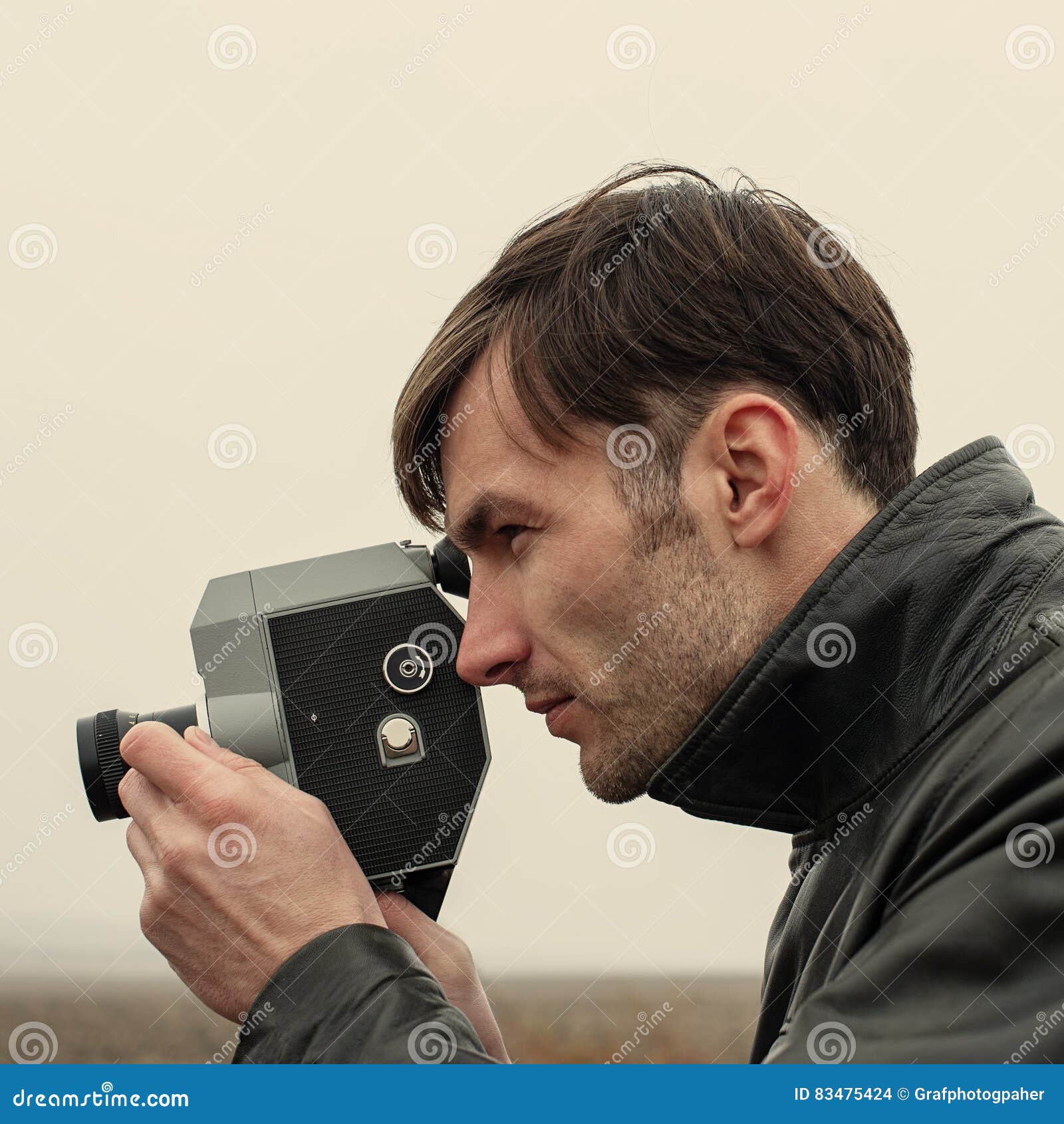 Man makes filming stock photo. Image of cinematography - 83475424