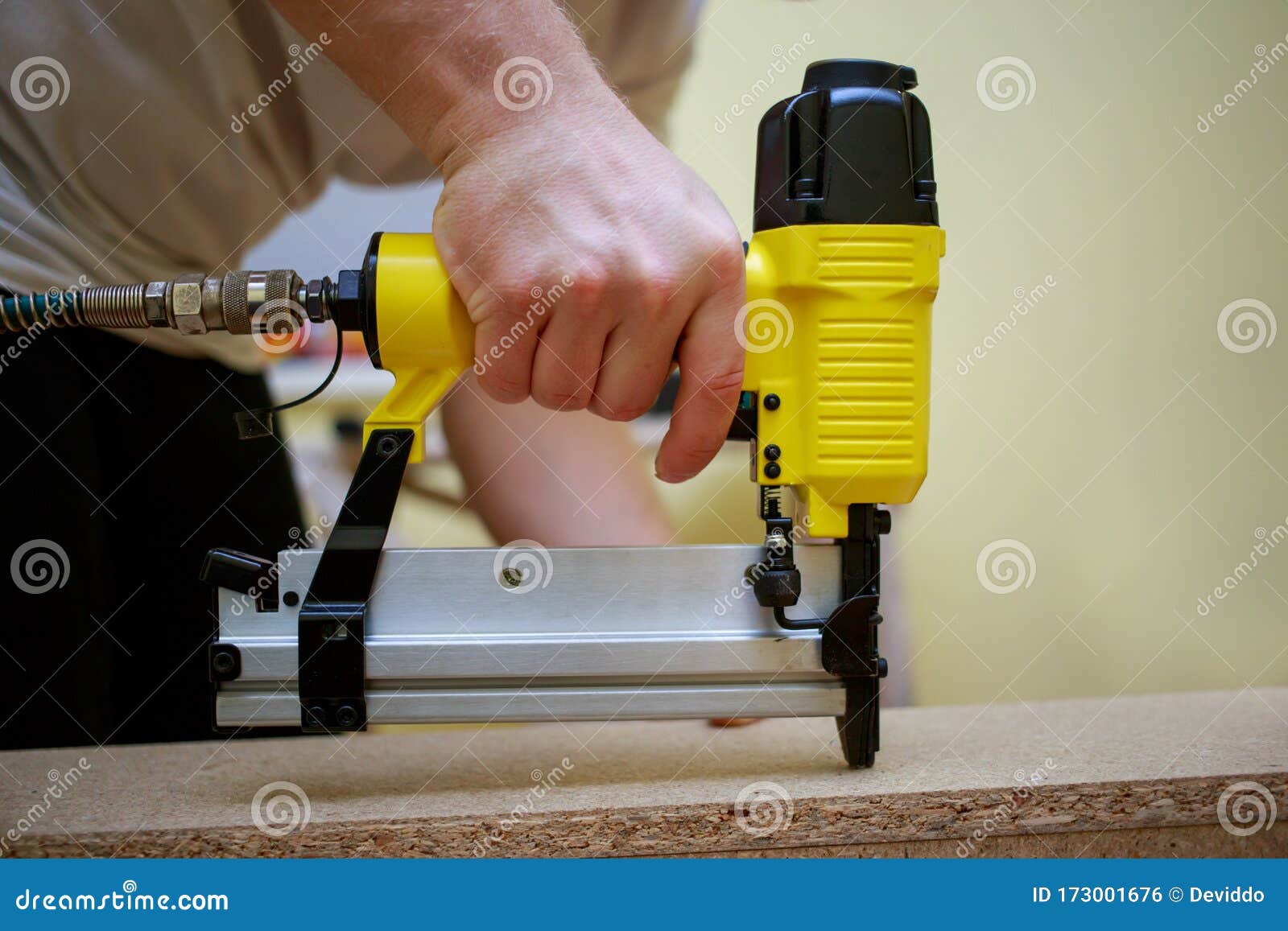 Man Working with Pneumatic Stapler Stock Photo - Image of stapler ...