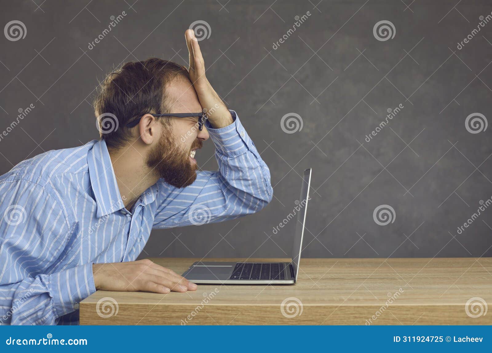 Man Makes a Stupid Mistake while Using His Computer and Slaps Himself ...