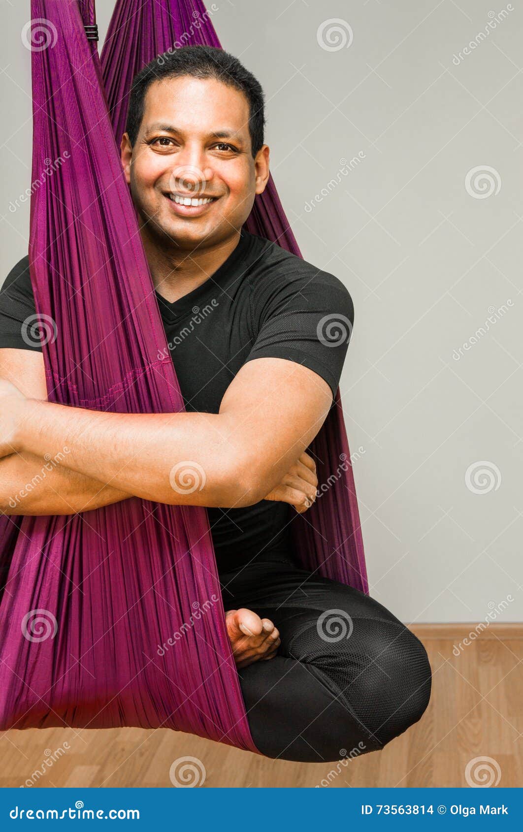 Man Making Aerial Yoga Exercises, Indoor Stock Photo - Image of aerial ... Man Making Aerial Yoga Exercises, Indoor Stock Photo - Image of aerial ...