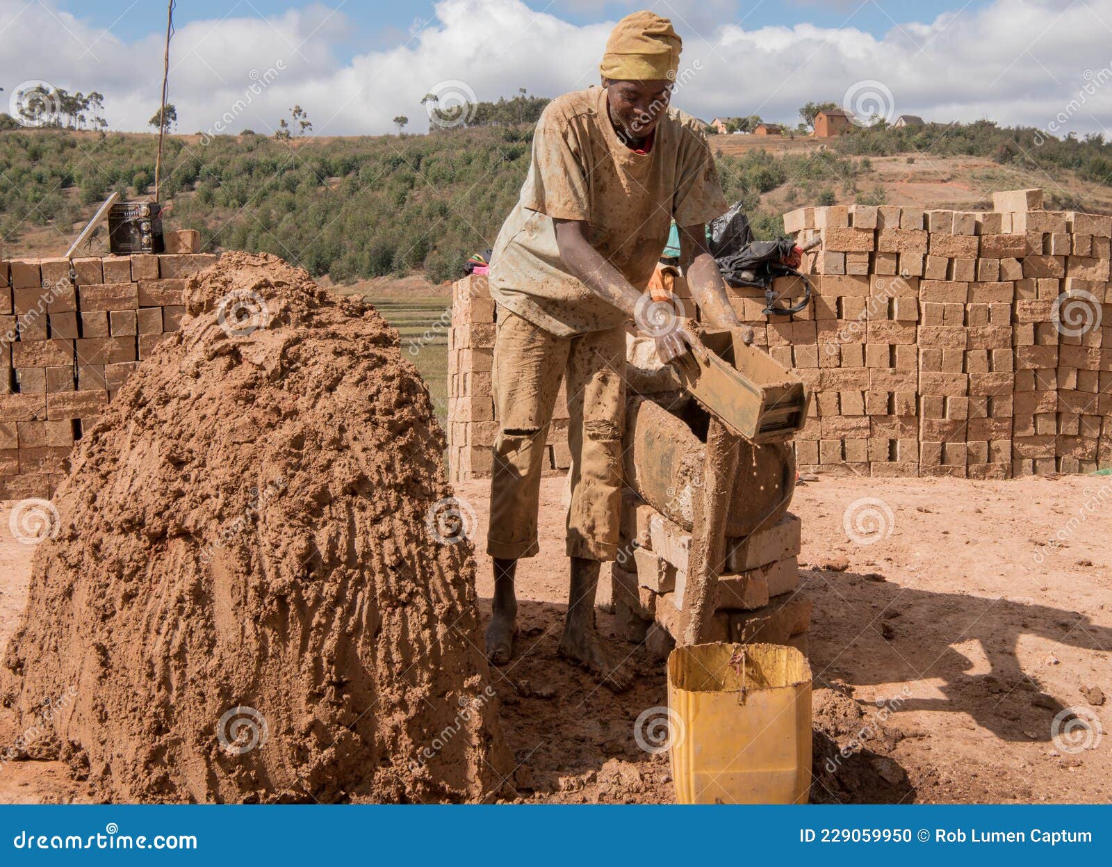 Africa: Man Making Bricks from Clay, by Hand in Madagascar Editorial ...