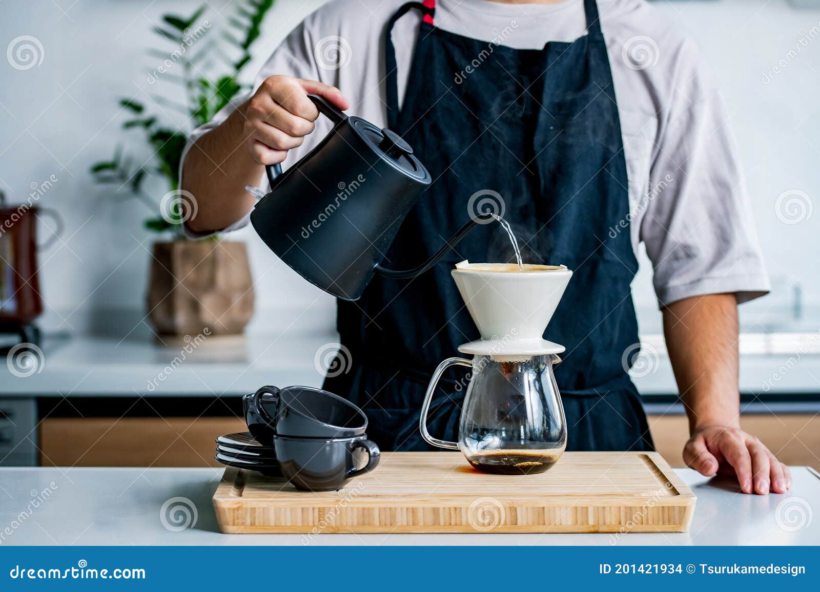 Man Making Coffee in the Kitchen. Delicious Coffee Image. Stock Photo ...