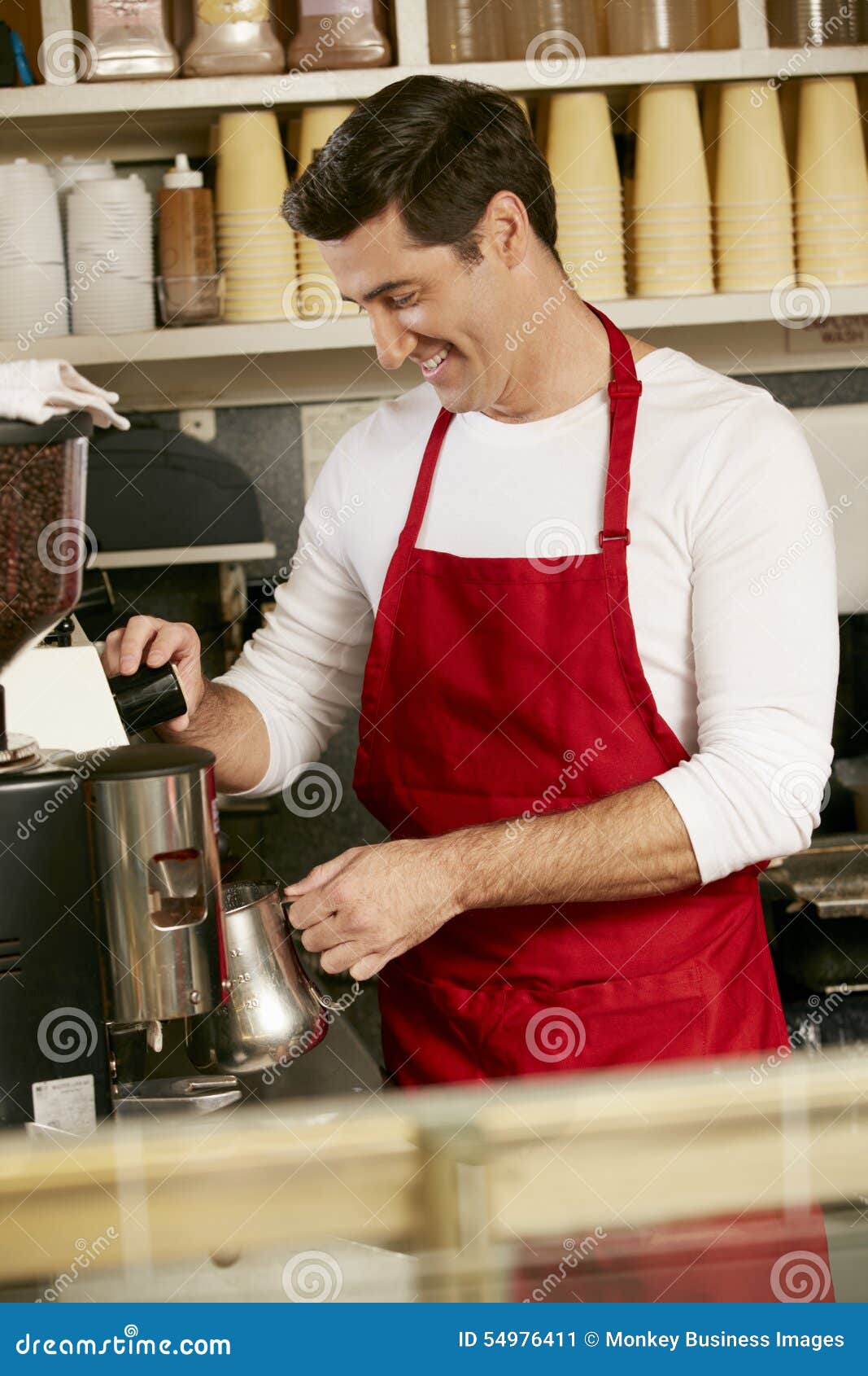Man Making Coffee in Shop stock image. Image of maker - 54976411