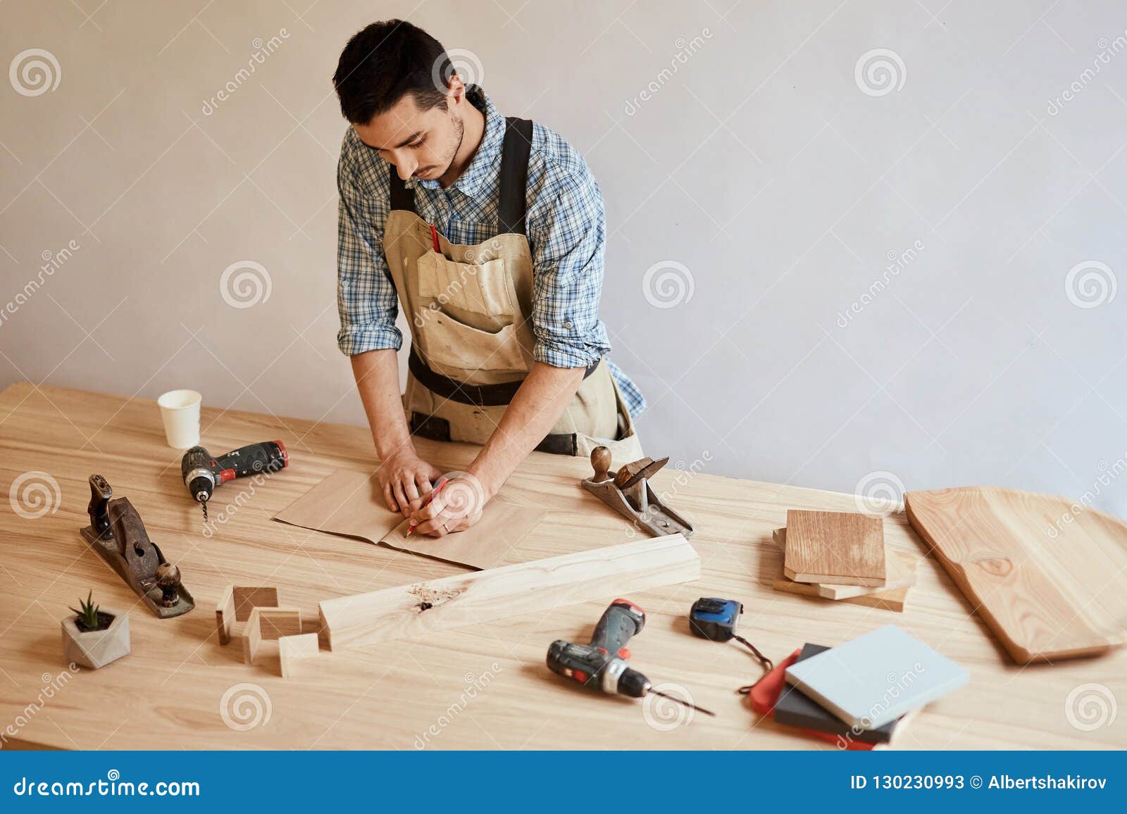 Man Making Draft Plan Using Pencil on the Table with Tools Stock Image ...