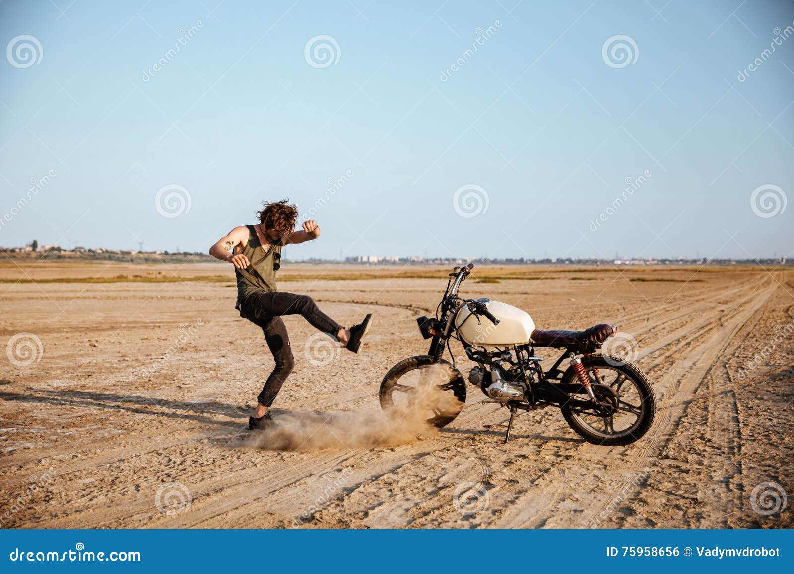 Man Making Dust Standing Near His Motorcycle Stock Photo - Image of ...