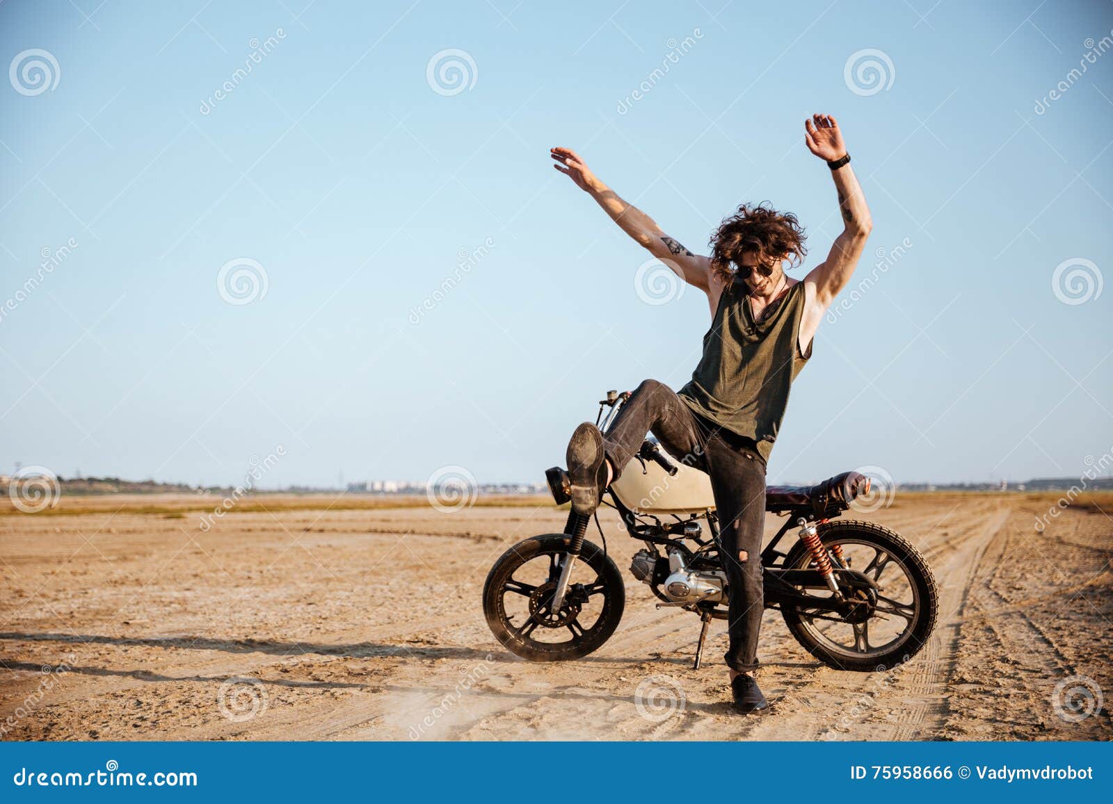 Man Making Dust Standing Near His Motorcycle Stock Photo - Image of ...