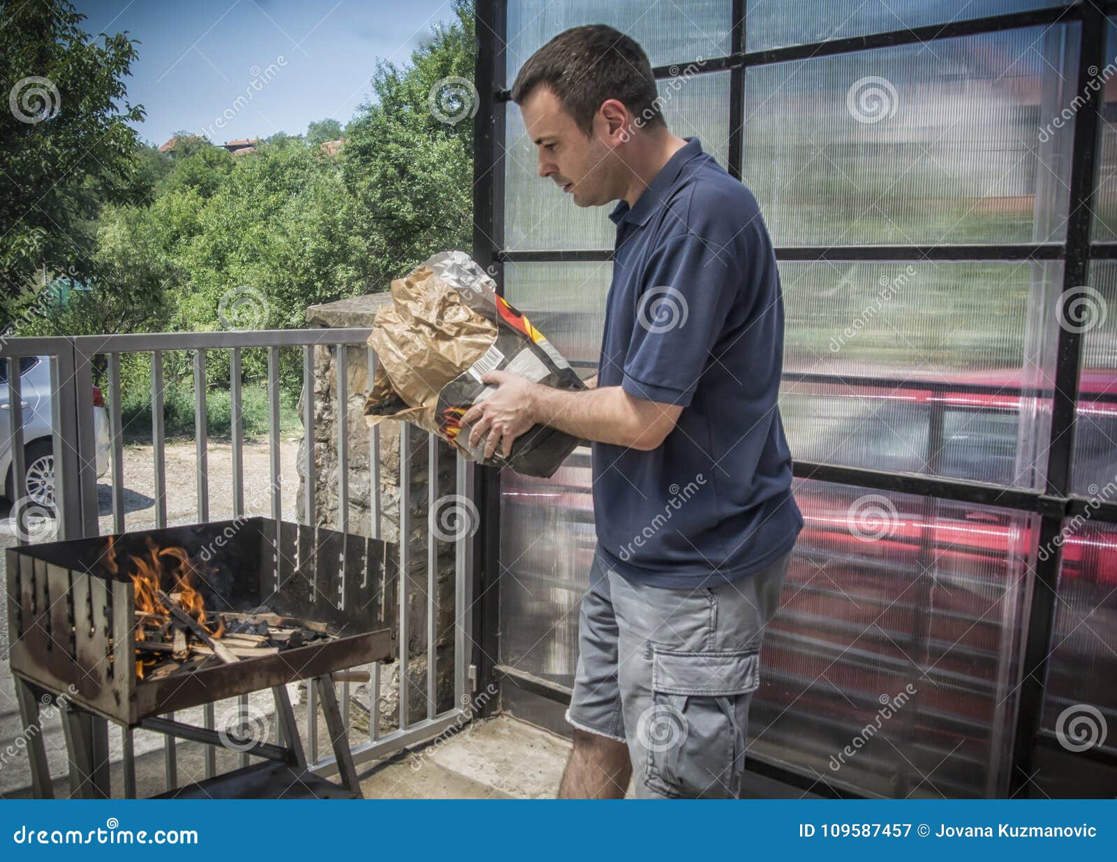 A man making barbecue stock image. Image of summer, roasted - 109587457