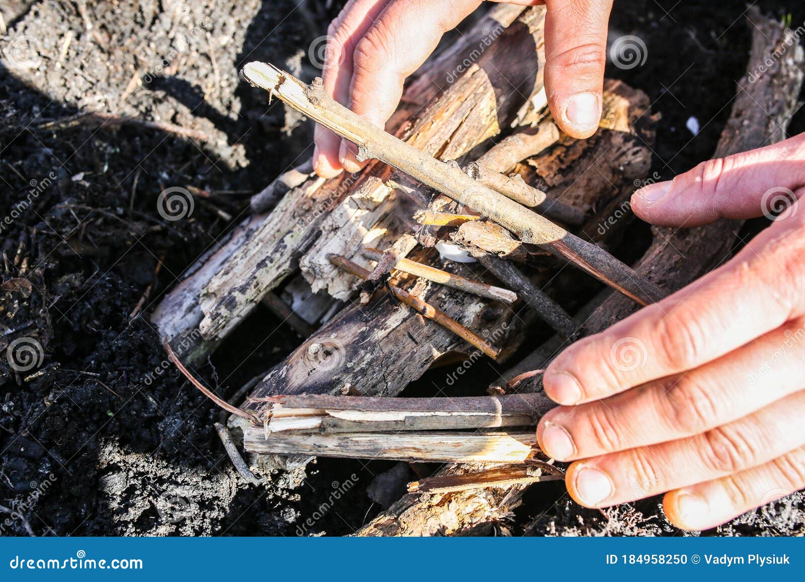 Man is Making Fire from Solid Alcohol. Tourist in the Nature Outdoors ...