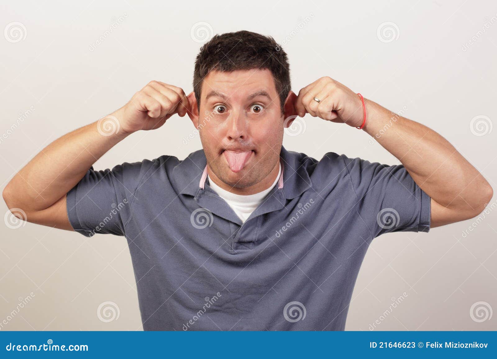 Man making a funny face stock image. Image of making - 21646623