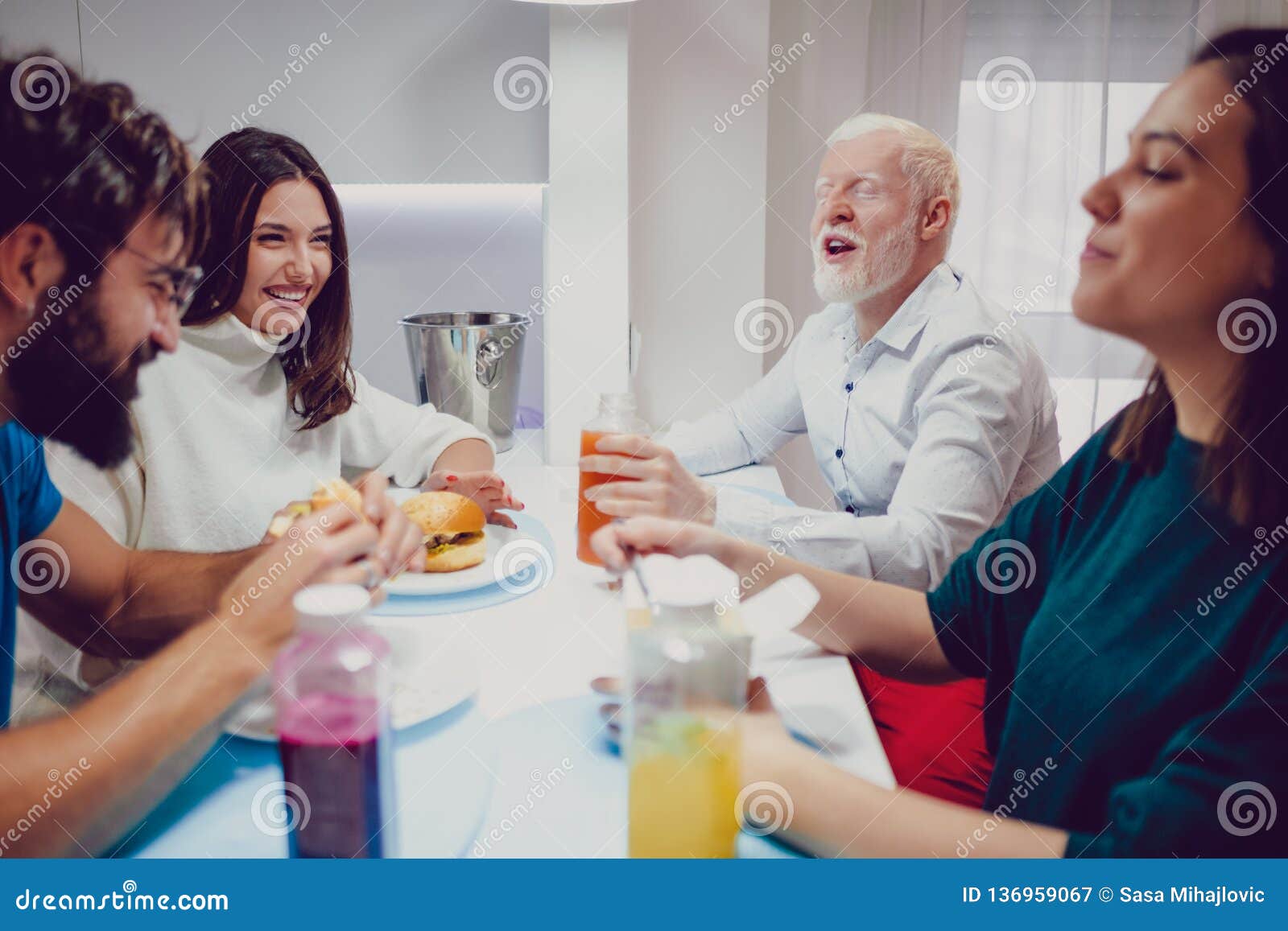 Man Making His Friends Laughing at the Lunch Stock Image - Image of ...