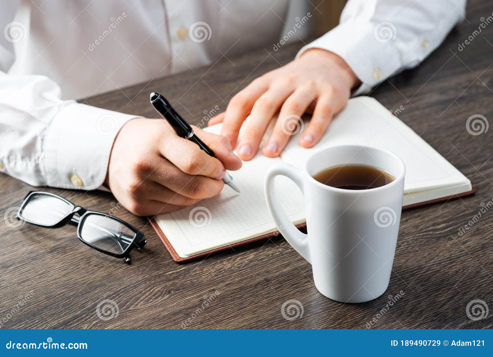 Man Making Notes with Pen in Notebook Stock Image - Image of ...