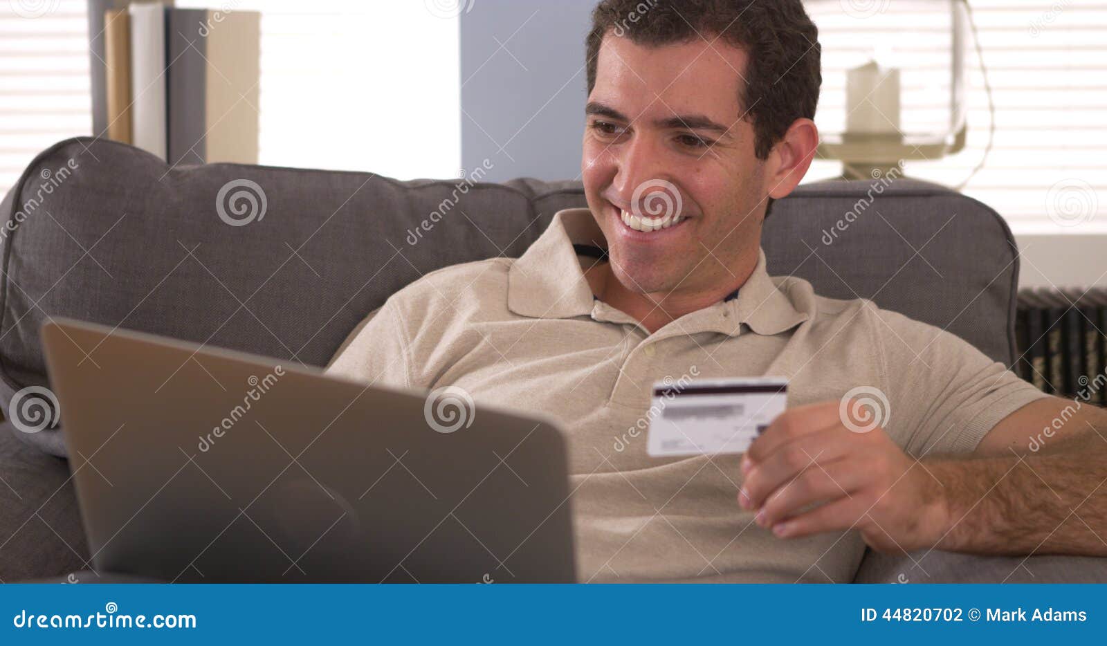 Man Making an Online Purchase with Laptop Stock Photo - Image of ...
