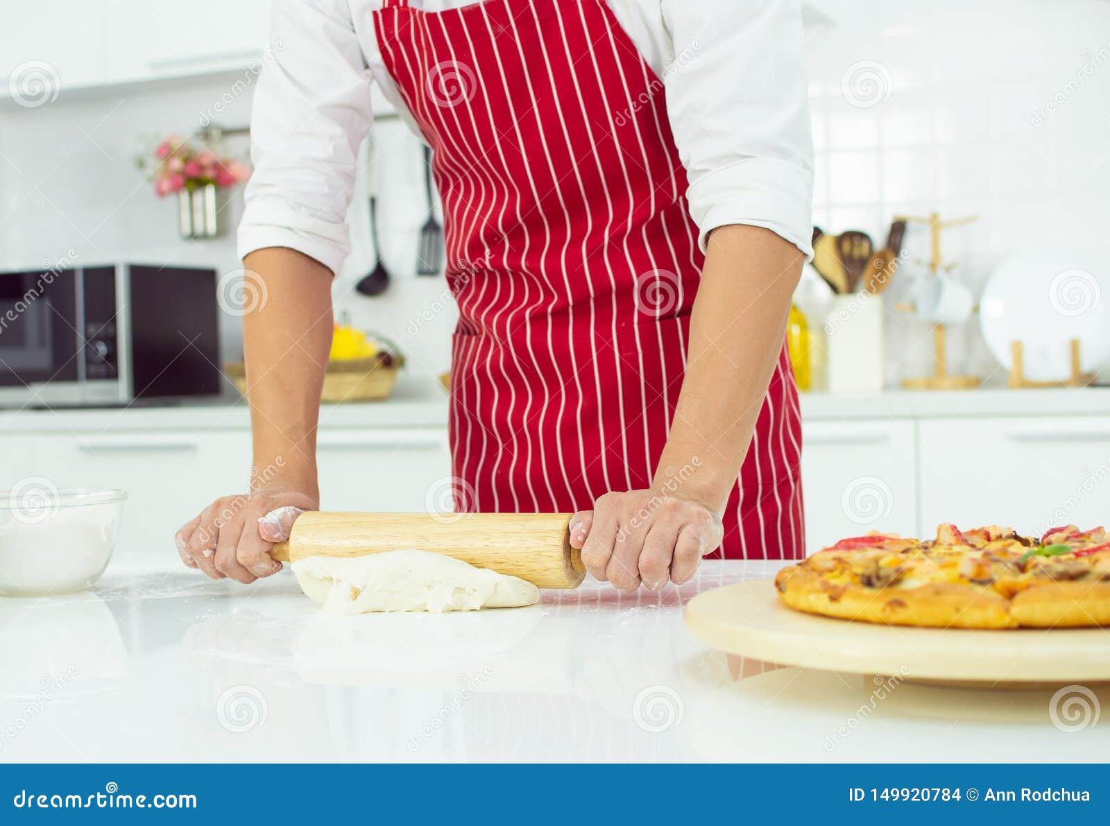 A man is making pizza stock photo. Image of bakery, bread - 149920784