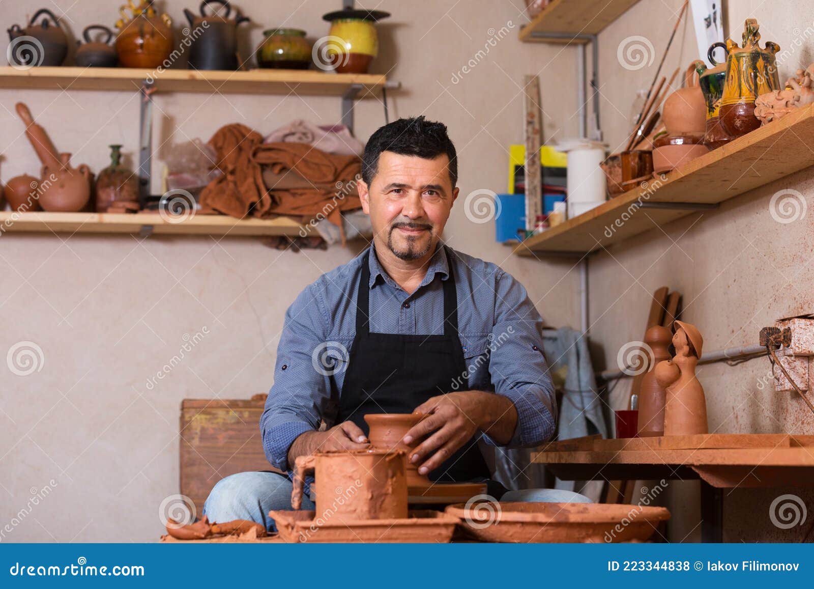 Man making pot stock photo. Image of male, artisan, wheel - 223344838