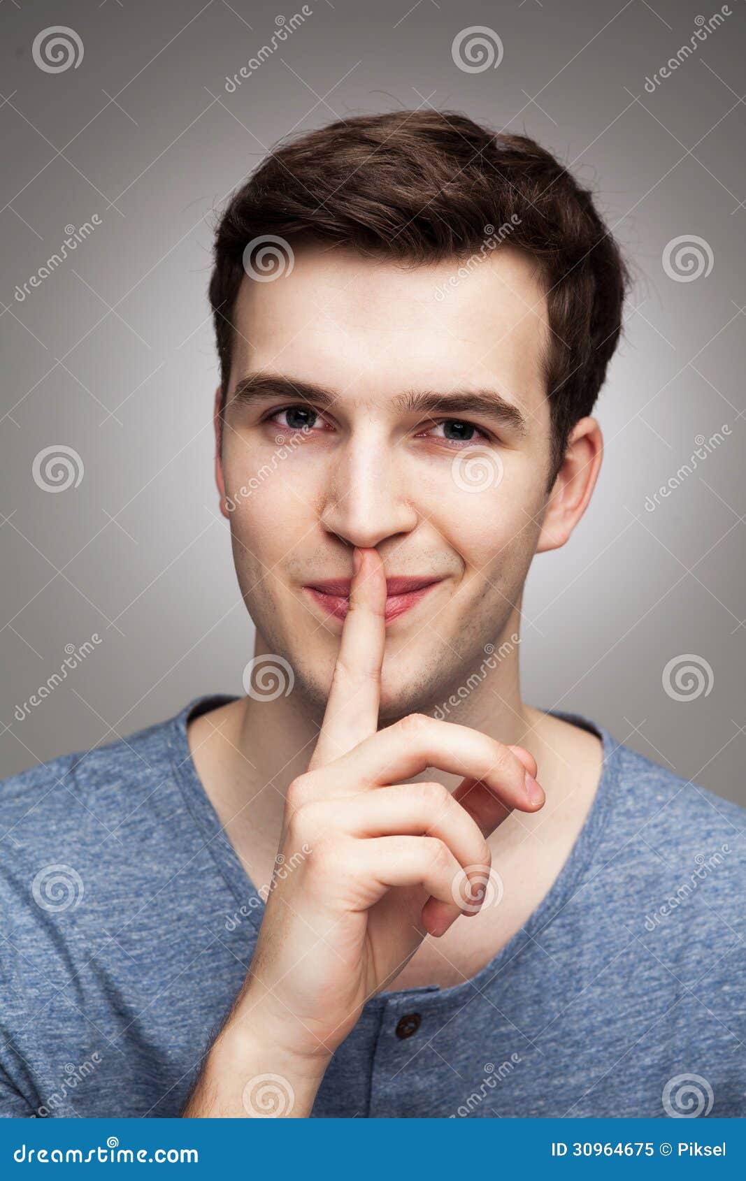 Man making silence gesture stock image. Image of young - 30964675
