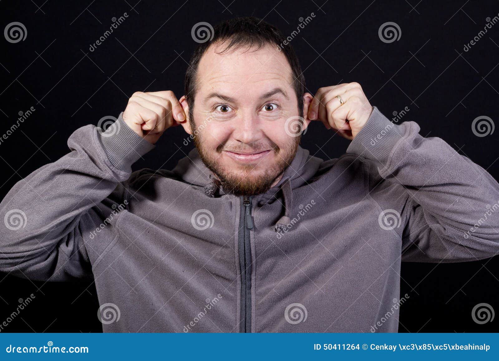 Man Making Silly Face by Pulling His Ears Stock Photo - Image of ...