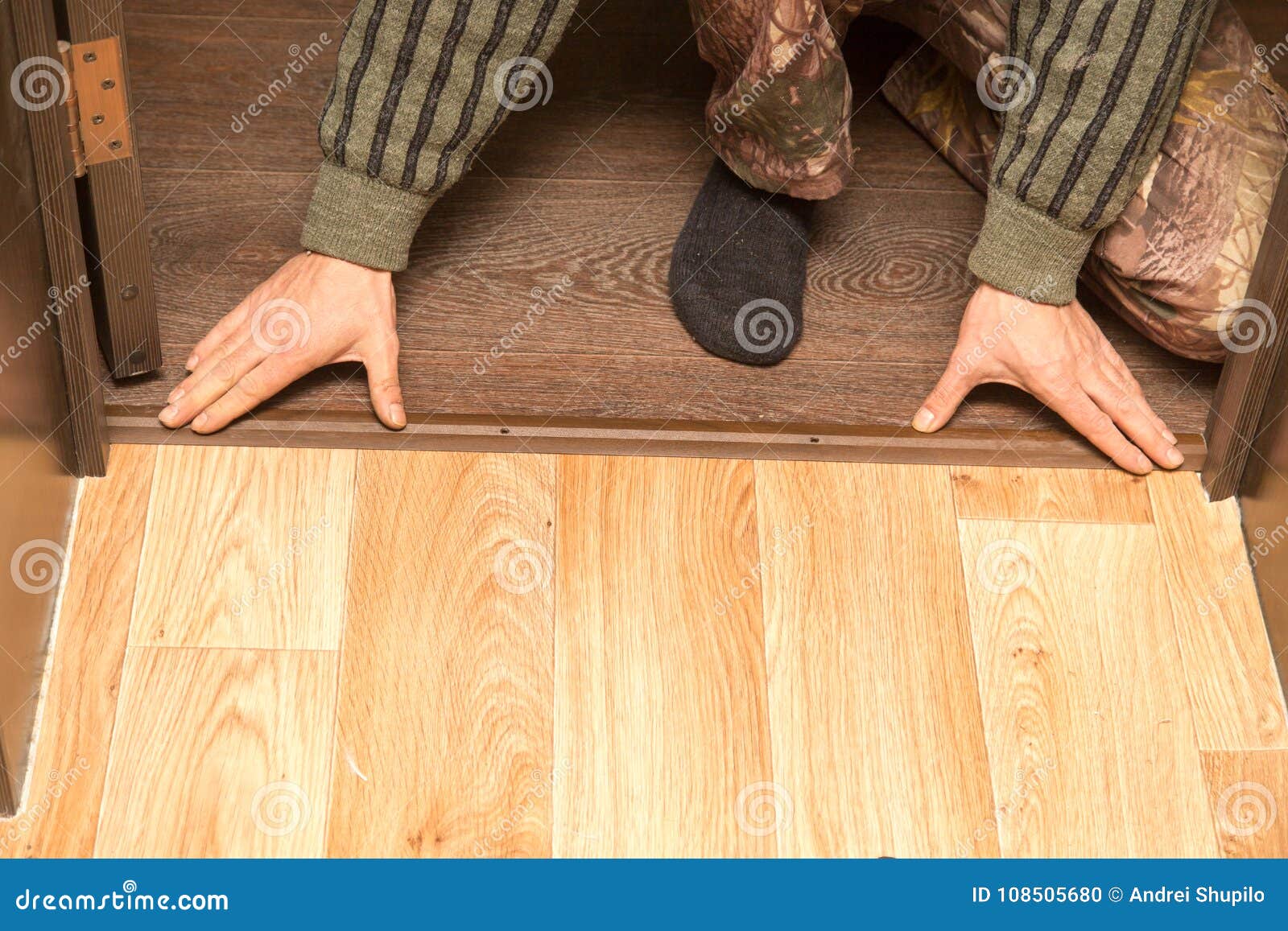A Man is Making a Threshold on the Floor Stock Photo - Image of white ...