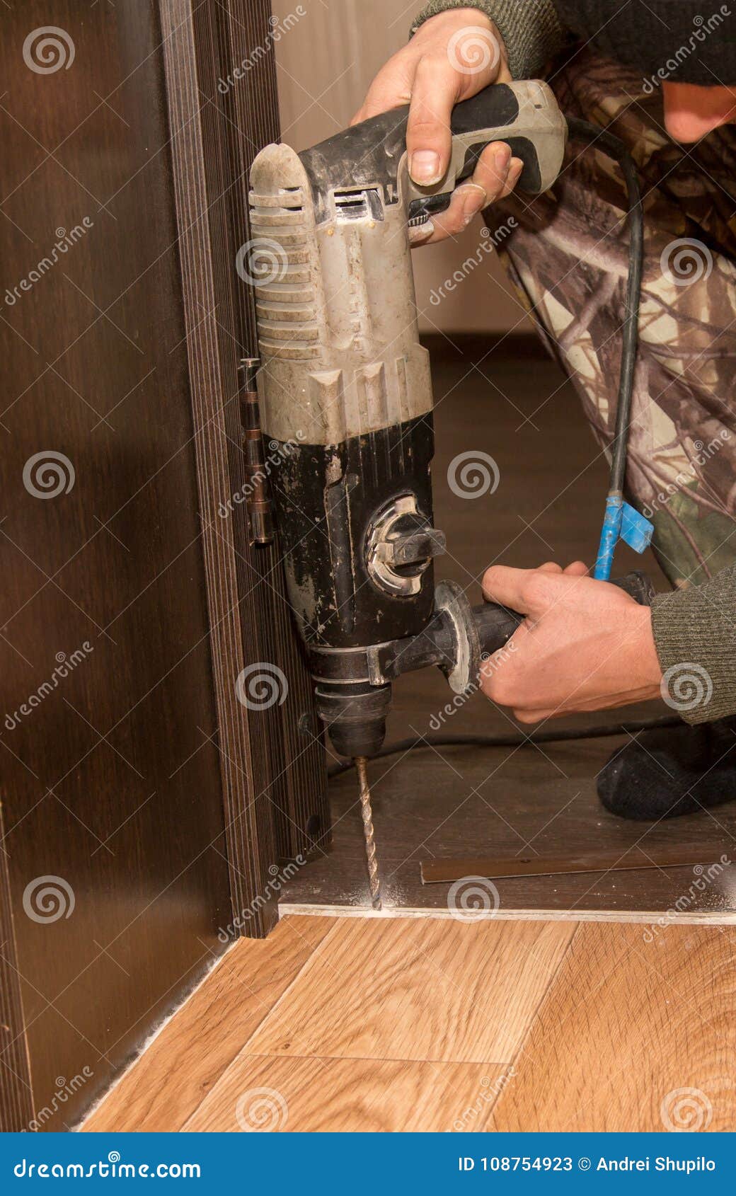 A Man is Making a Threshold on the Floor Stock Image - Image of stave ...