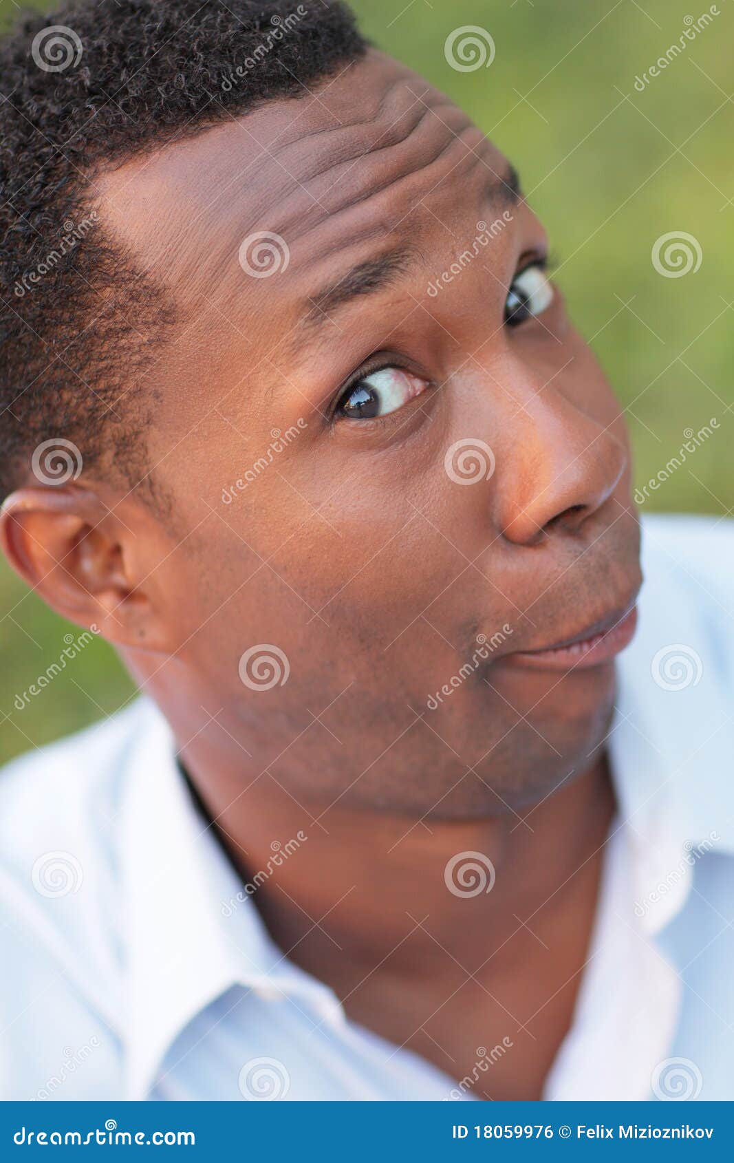 Man making an unusual face stock photo. Image of shirt - 18059976