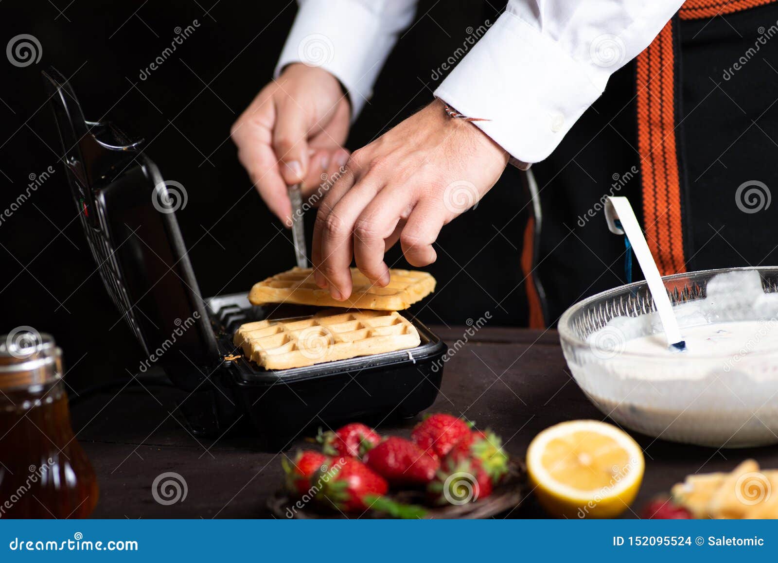 Man Making Waffles on a Waffle Machine Stock Photo - Image of bakery ...