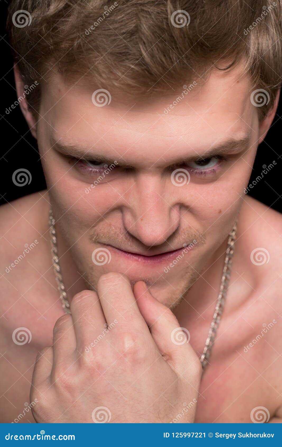 Man with a malicious grin stock image. Image of chain - 125997221