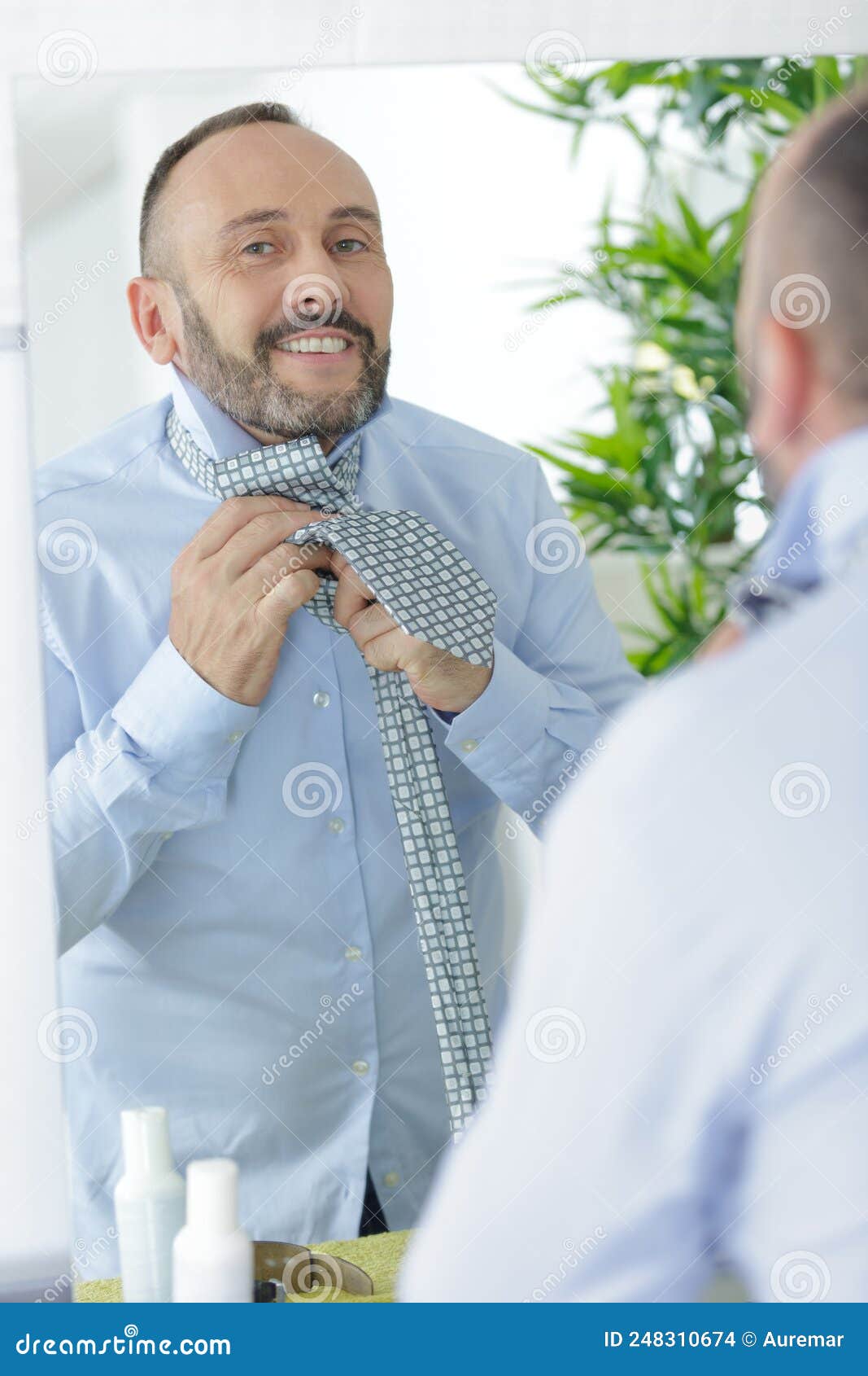 Man man getting dressed stock photo. Image of room, professional ...