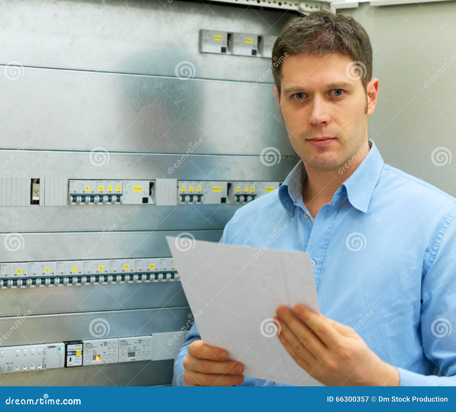 Man with manual. stock image. Image of engineer, checking - 66300357