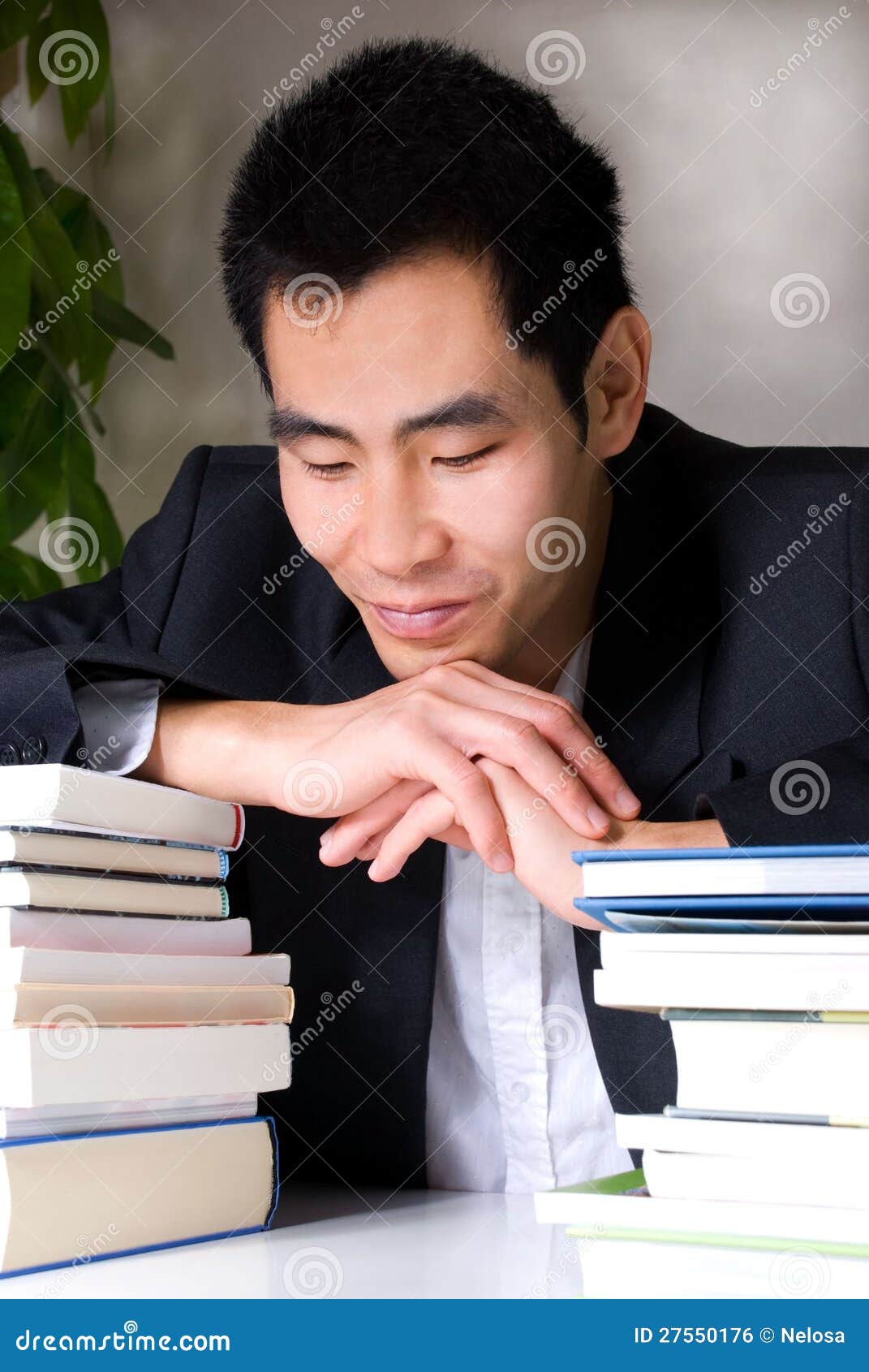 Man with many books stock photo. Image of meditation - 27550176