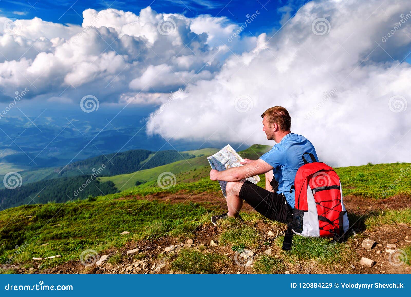 Man with Map and Red Backpack Stock Image - Image of clouds, freedom ...