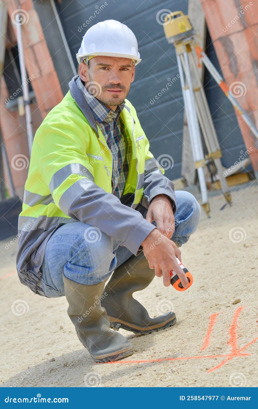 Man marking pavement stock image. Image of safety, limitation - 258547977