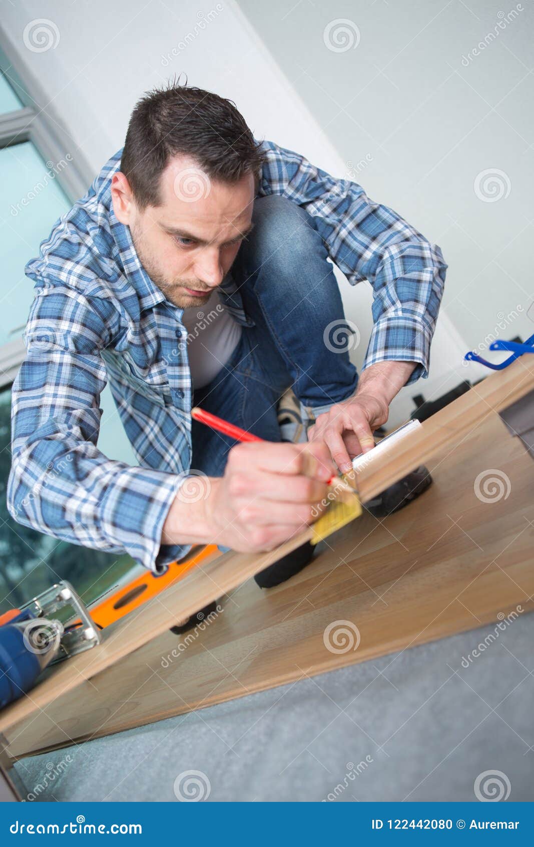 Man Marking Position on Floorboard Stock Photo - Image of renovation ...