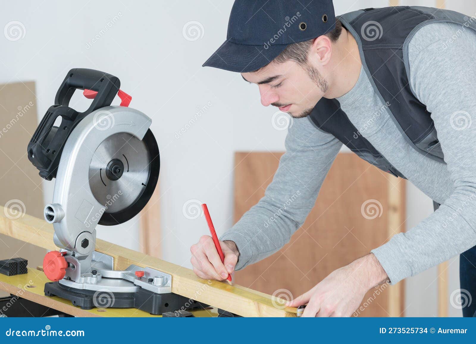 Man marking wood stock photo. Image of labor, carpenter - 273525734