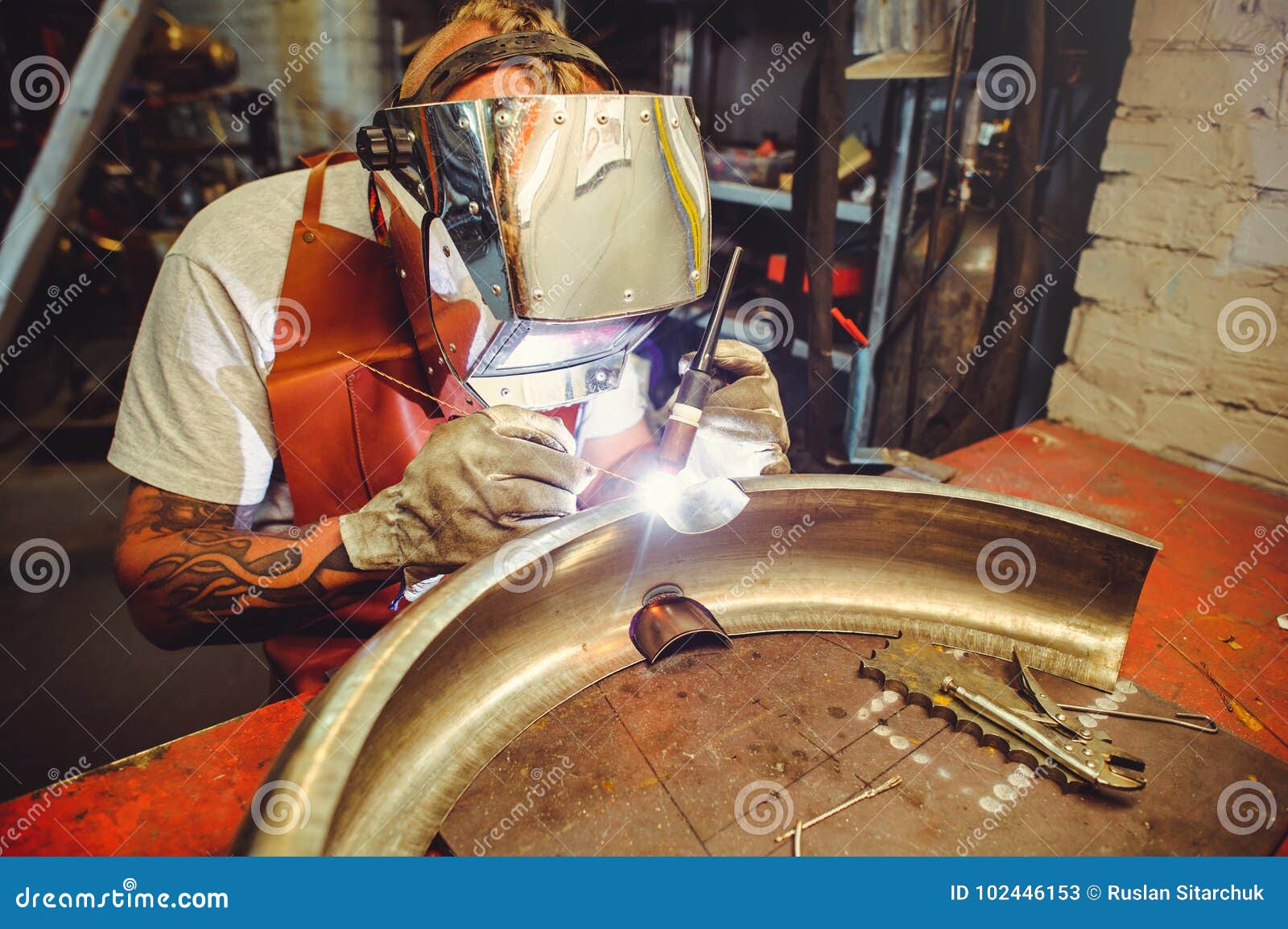 The Man in the Mask Brews Beautiful Welds with Argon-arc Welding Stock ...