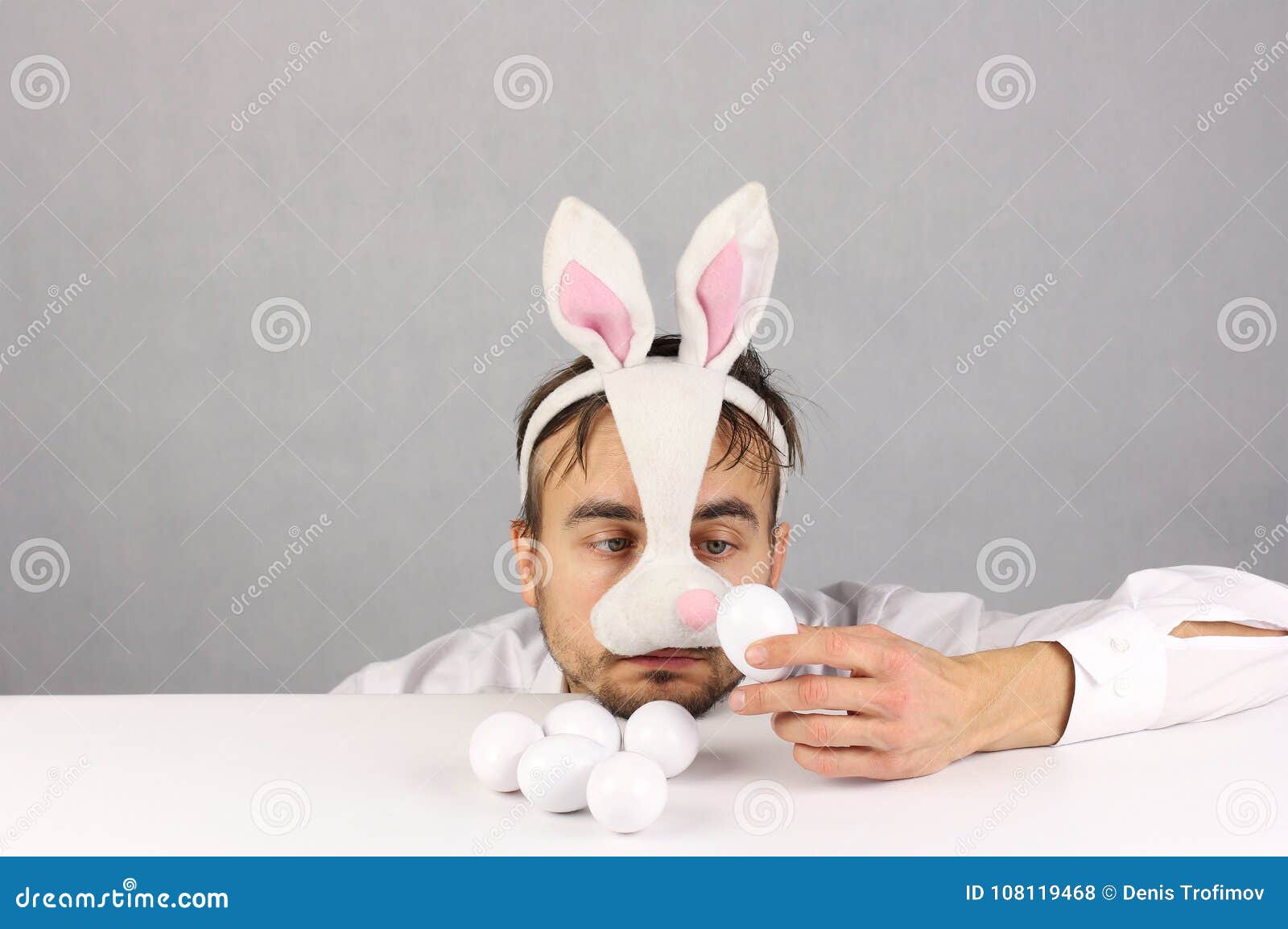 Man in the Mask Easter Rabbit Looking at the Egg Stock Photo - Image of ...