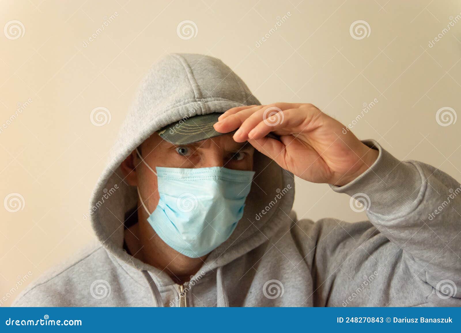 A Man with a Mask on His Face and a Hood on His Head Stock Image ...