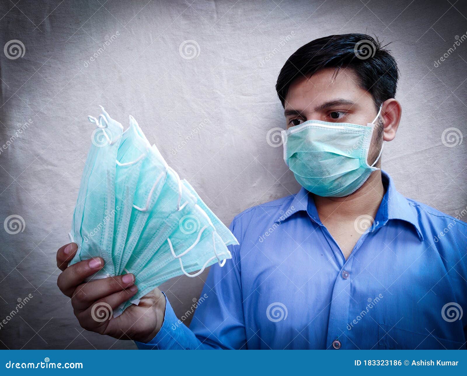 Man in Mask Hold Mask Bunch in Hand Stock Photo - Image of protective ...