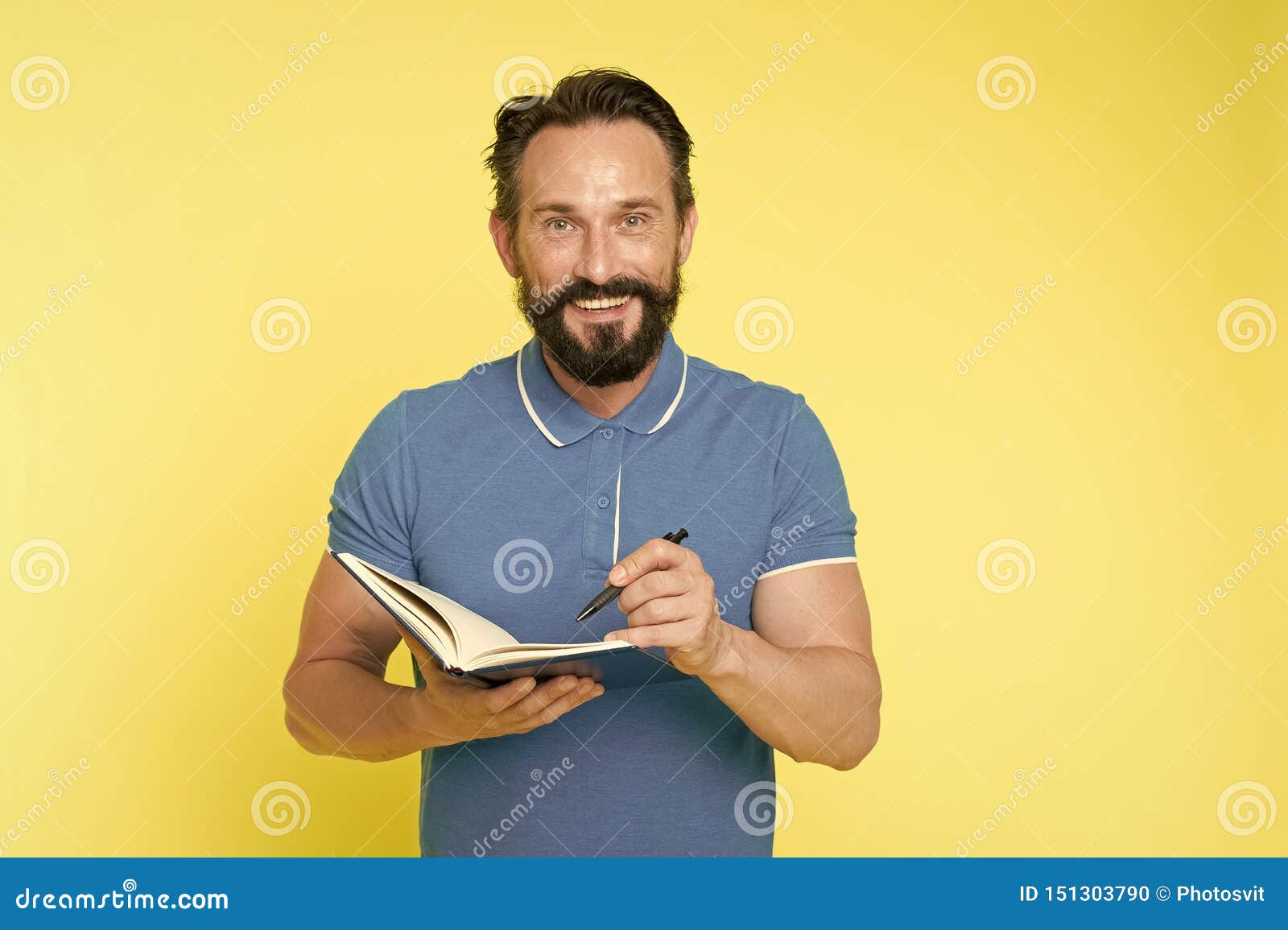 Man Mature Bearded Guy Writing Notes To Notepad. Check What is Done ...