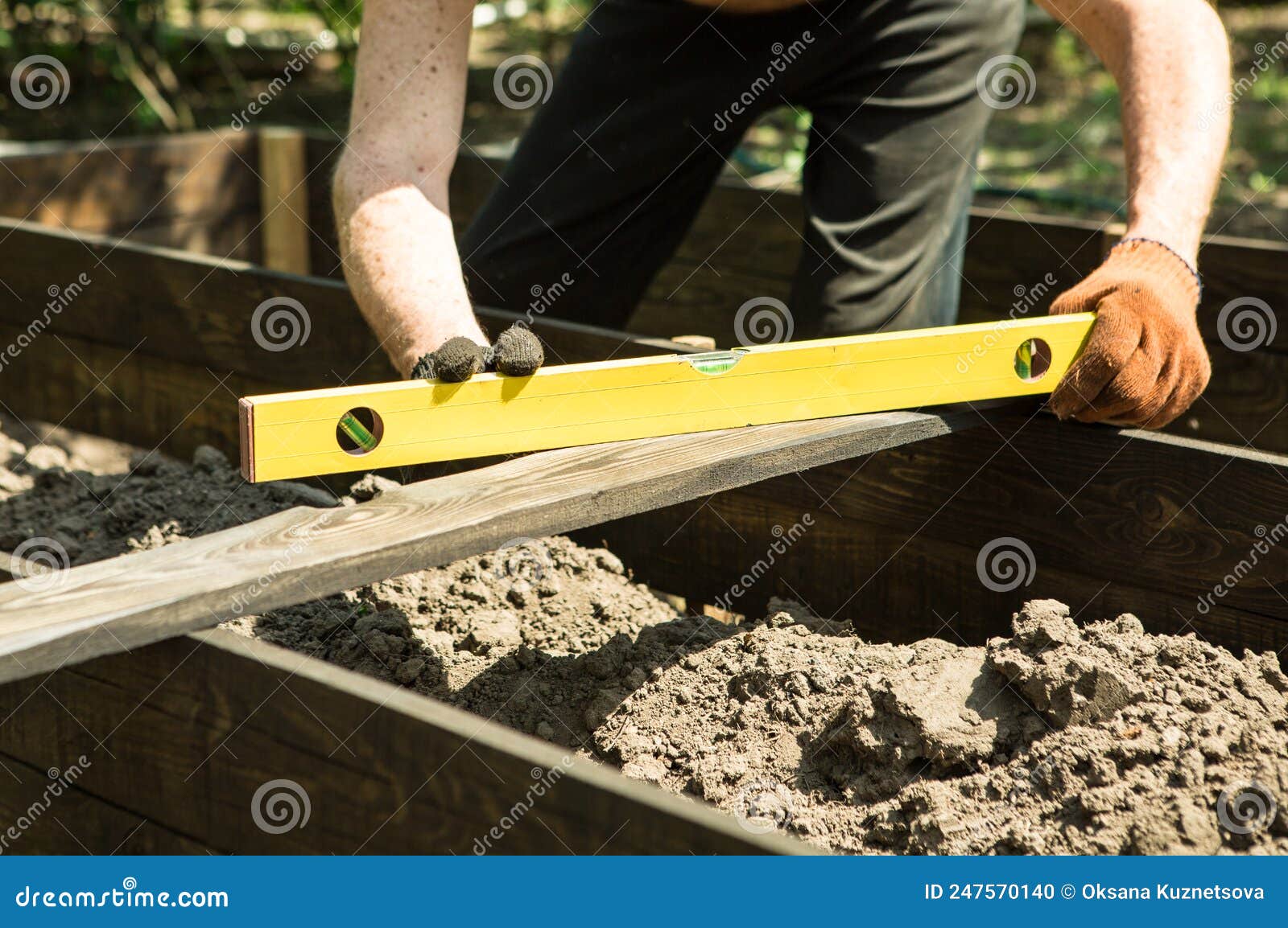 A Man of Mature Years Makes High Beds on a Personal Plot. the Master ...