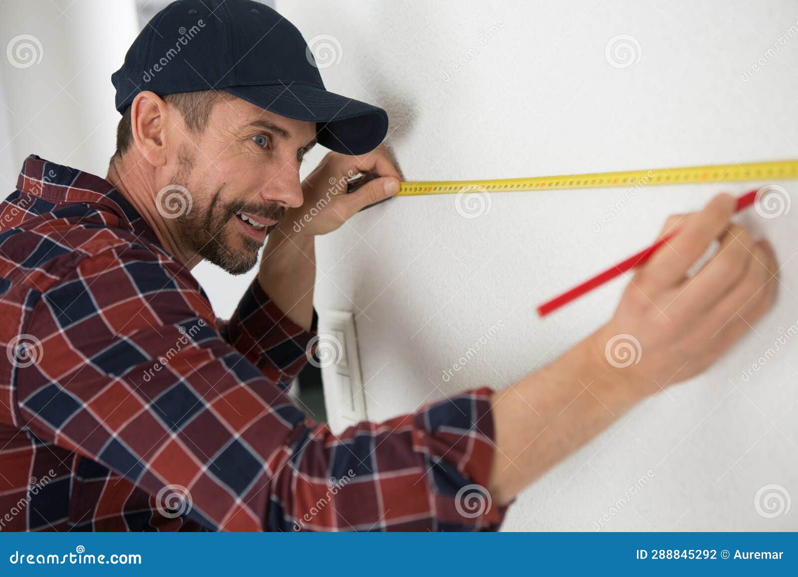 Man Measures Wall with Ruler Stock Photo - Image of home, builder ...