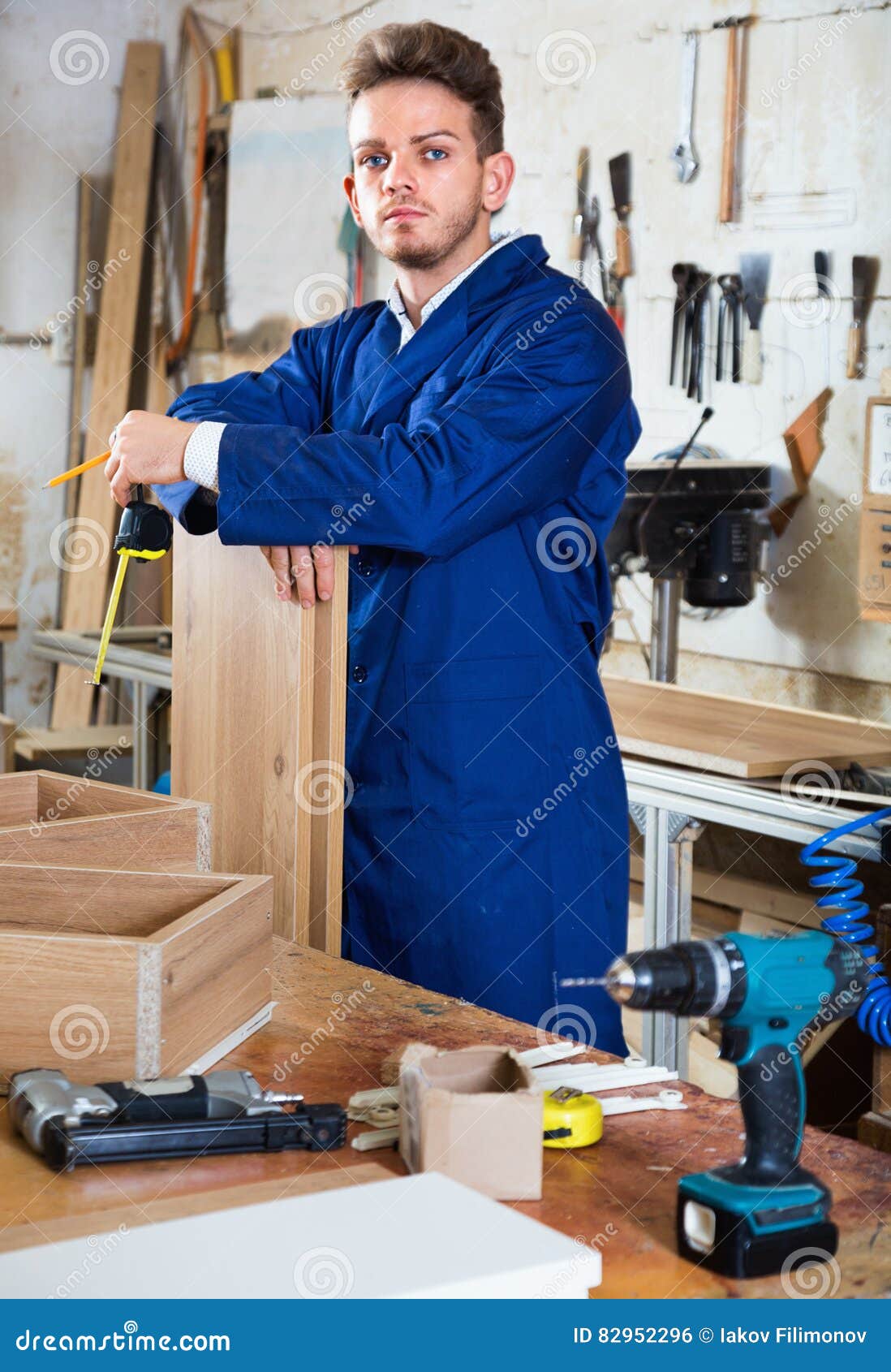 Man Measuring Boards for Furniture at Workshop Stock Photo - Image of ...