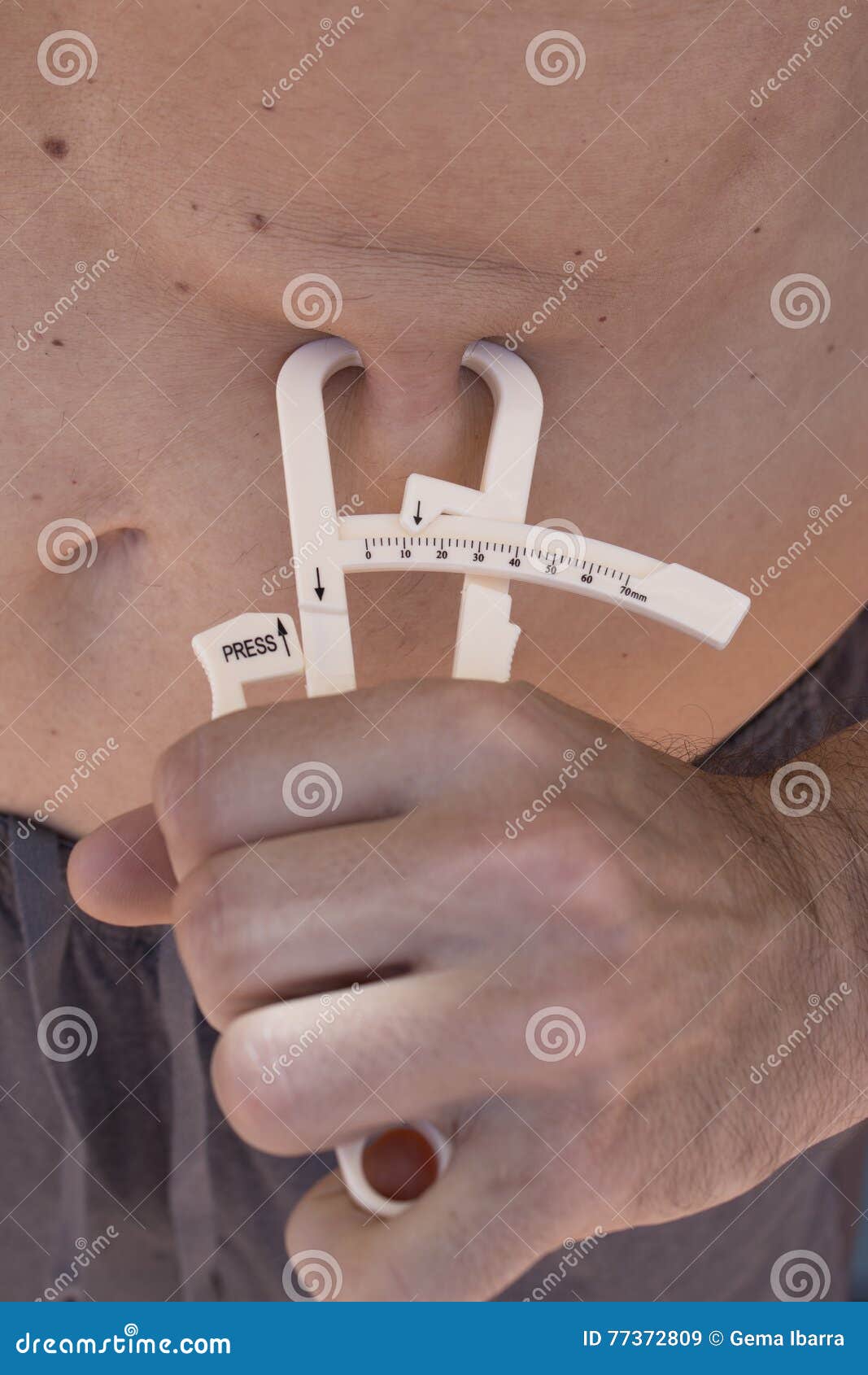Man Measuring Body Contouring Stock Image - Image of holding, male ...