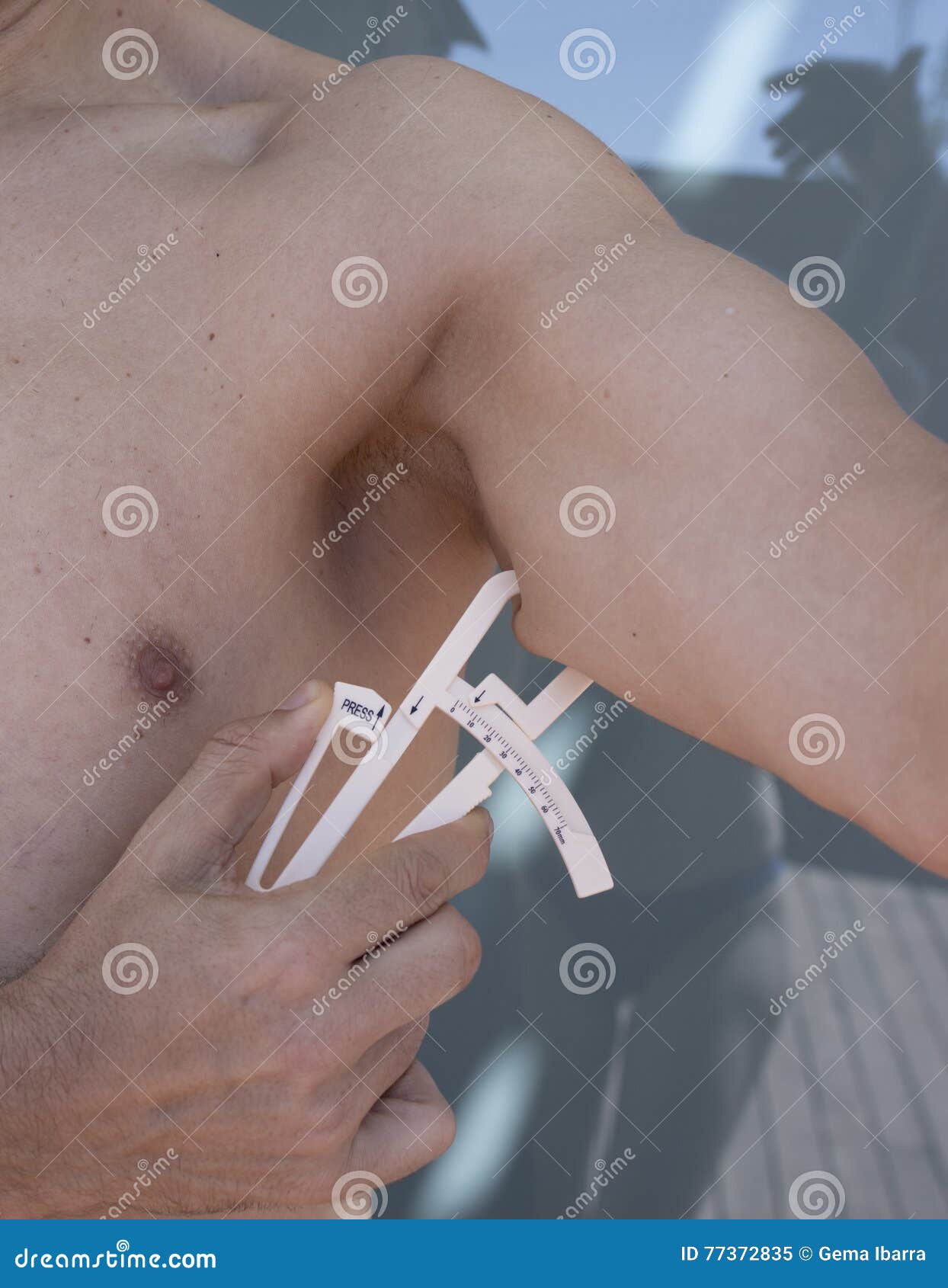 Man Measuring Body Contouring Stock Image - Image of adult, holding ...